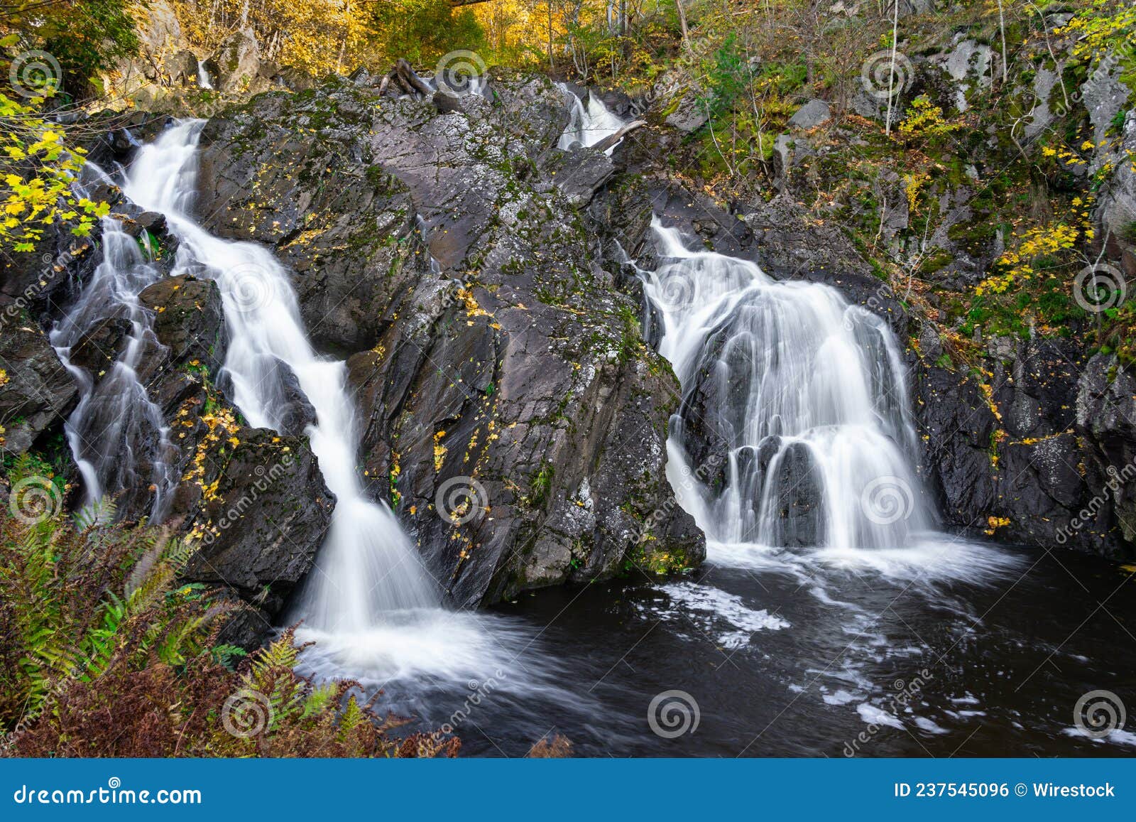 Beautiful View of a Waterfall and Cliffs in a Forest Stock Photo ...