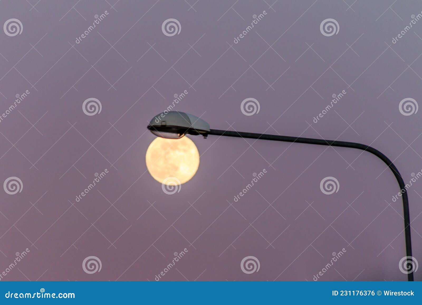 Beautiful View of a Whole Moon and a Streetlight Visually Together ...