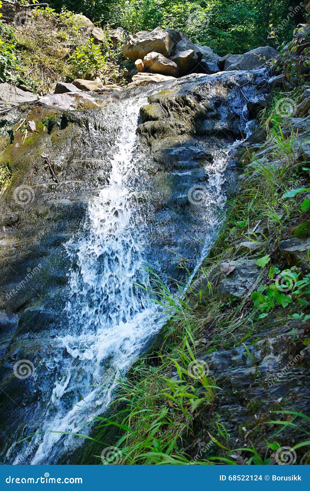 Beautiful Waterfall Breaks Off Cliff in the Forest Stock Photo - Image ...