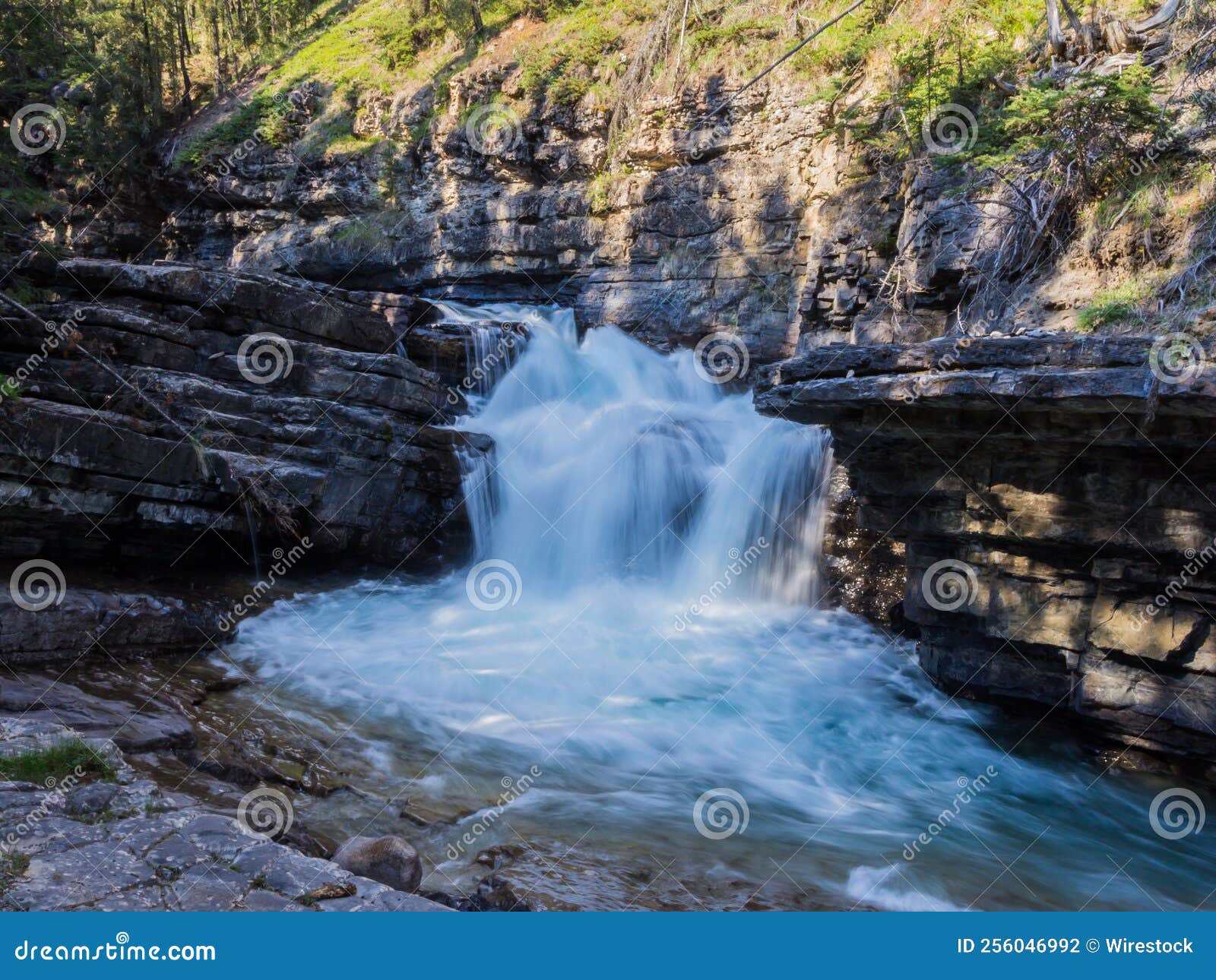 Beautiful Waterfall Flowing through the Cliffs Stock Photo - Image of ...