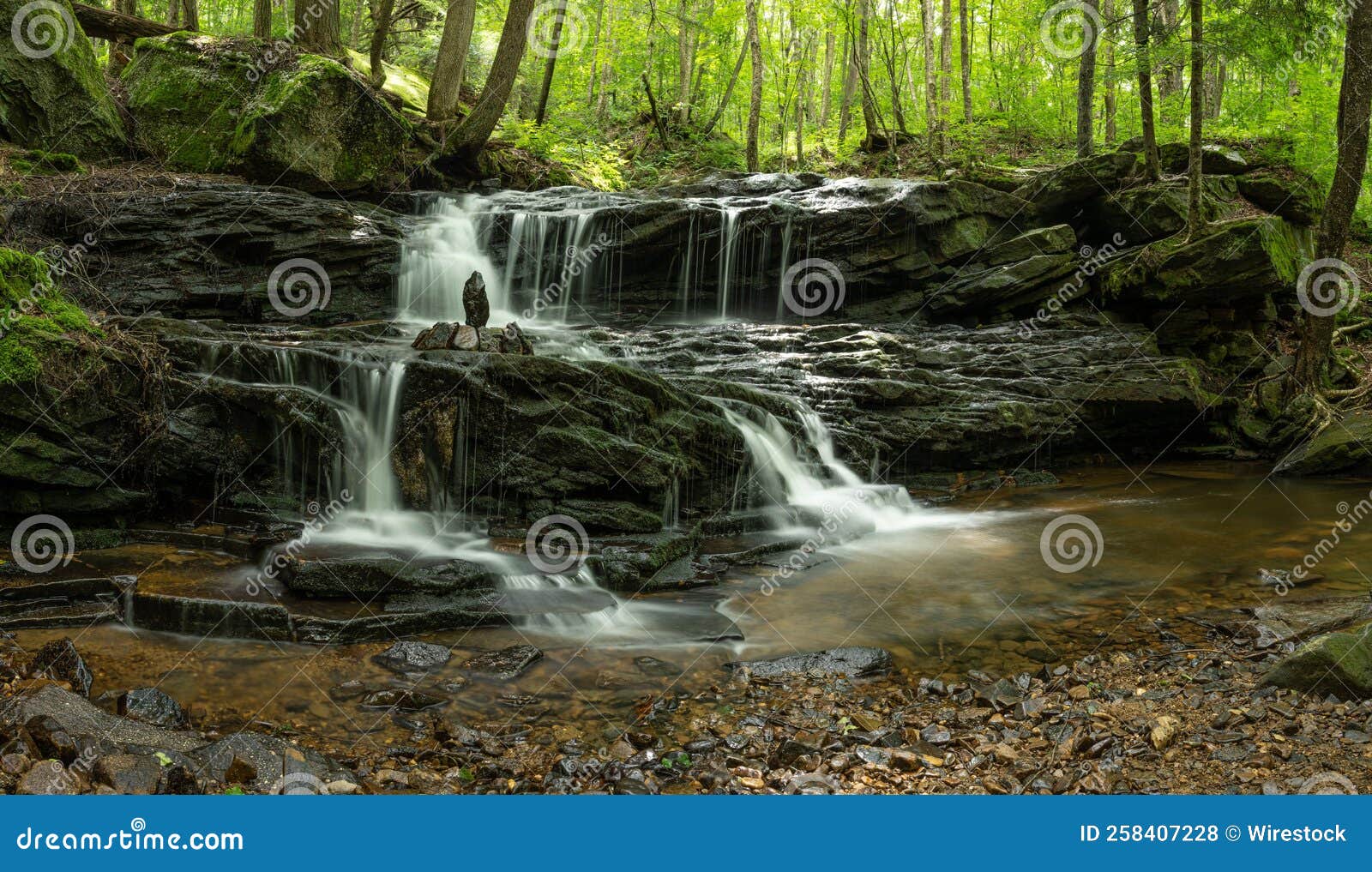 Beautiful Waterfall Flowing in the Deep Forest Stock Photo - Image of ...