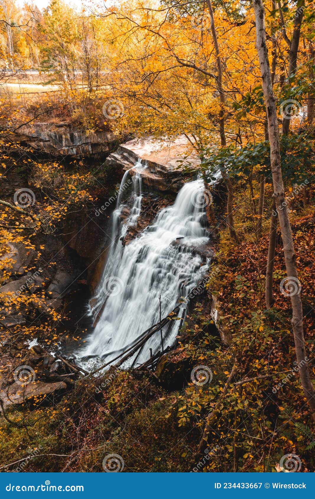 Beautiful Waterfall in the Forest in the Fall Colors Stock Image ...