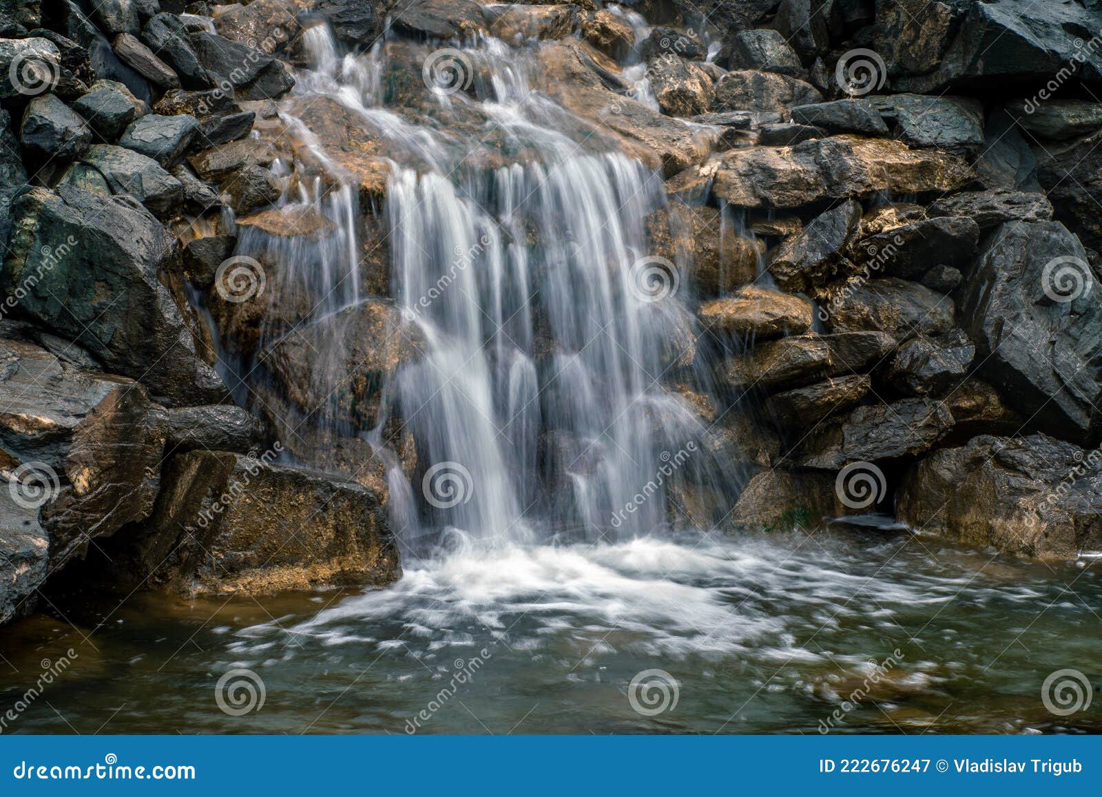 A Beautiful Waterfall. Waterfall on the River. Stone Wall with a ...