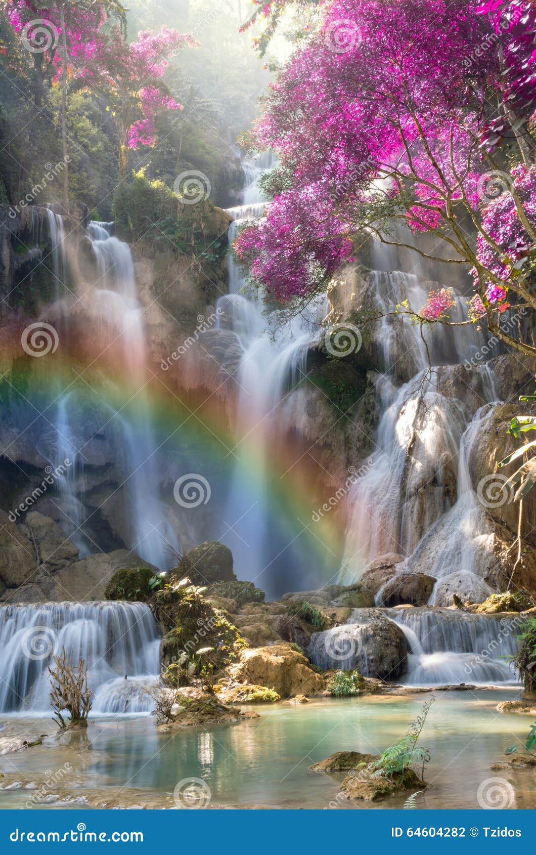Beautiful Waterfall with Soft Focus and Rainbow in the Forest Stock ...