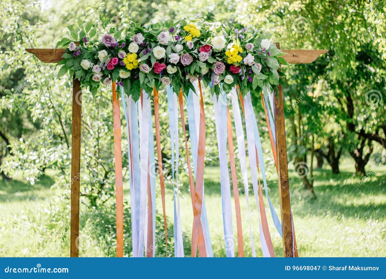 Beautiful Wedding Arch with Flowers on Forest at Summer Day. Stock ...