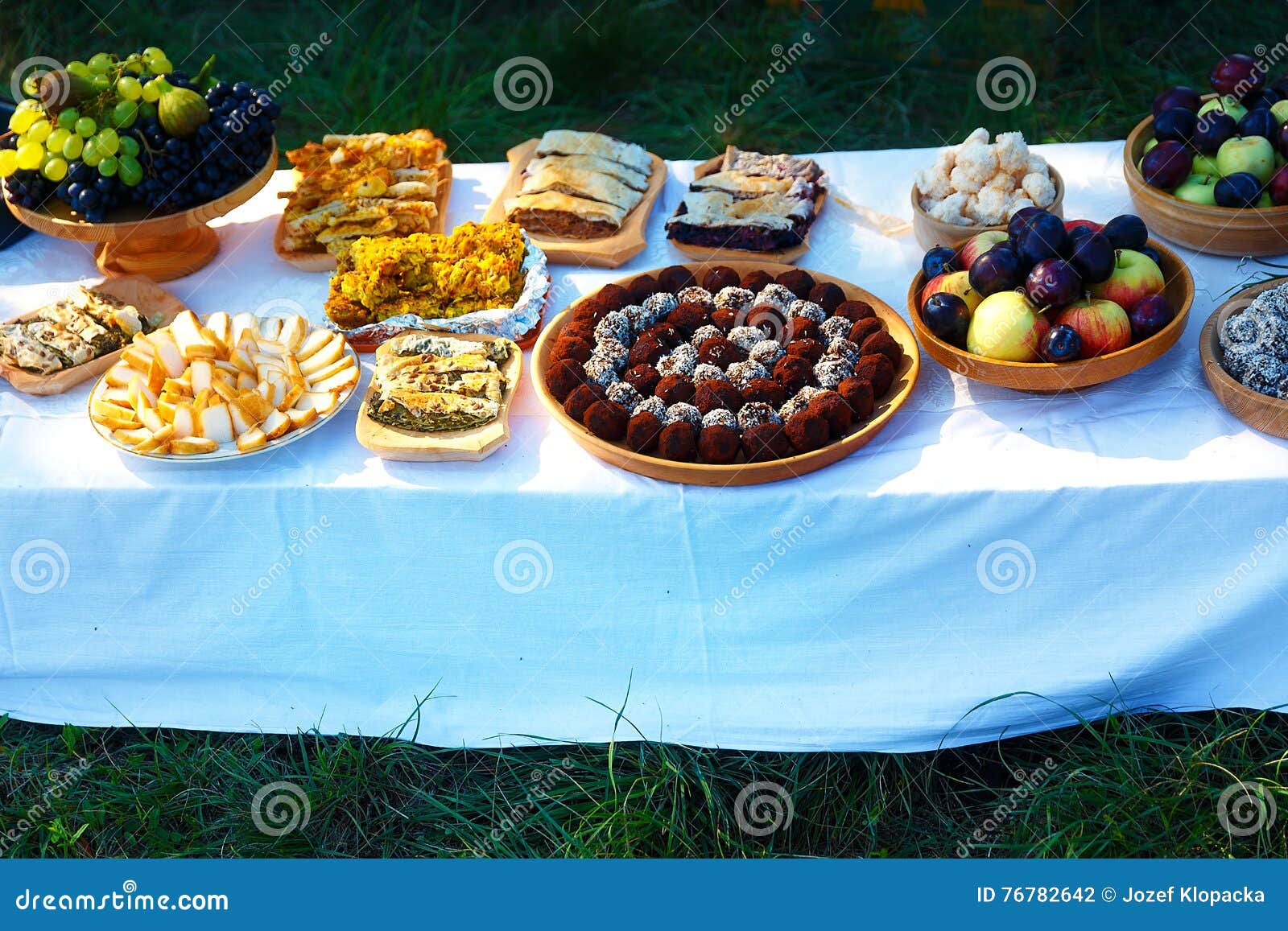 Beautiful Wedding Feast in Nature, Abundance of Meals on a Table. Stock ...