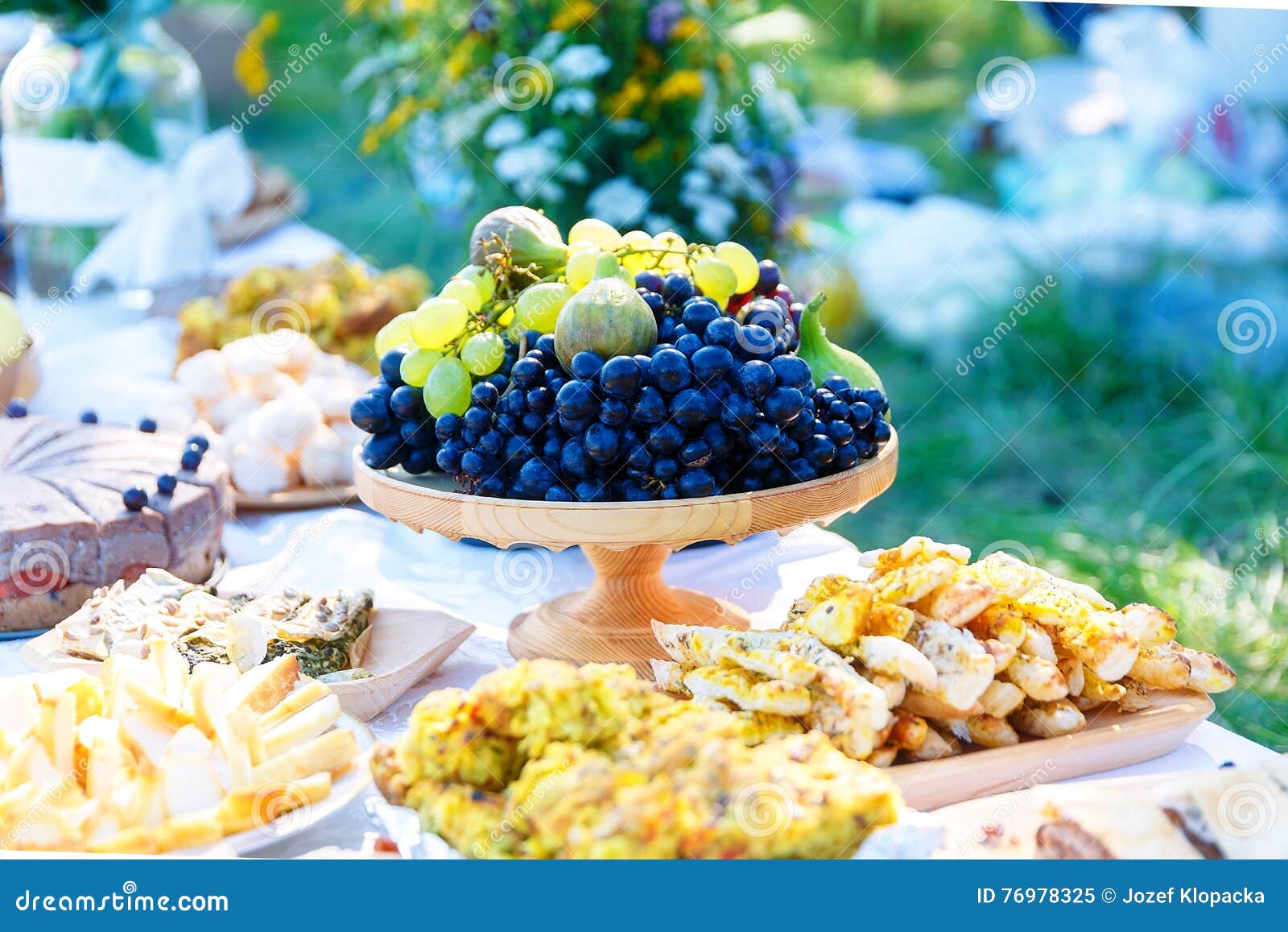 Beautiful Wedding Feast in Nature, Abundance of Meals on a Table. Stock ...