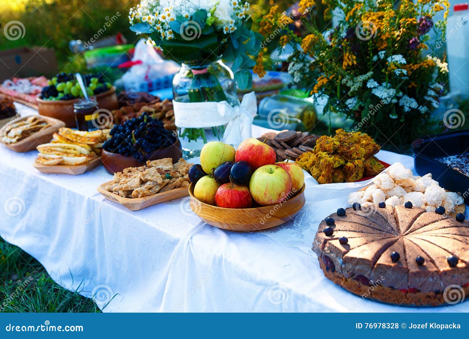Beautiful Wedding Feast in Nature, Abundance of Meals on a Table. Stock ...