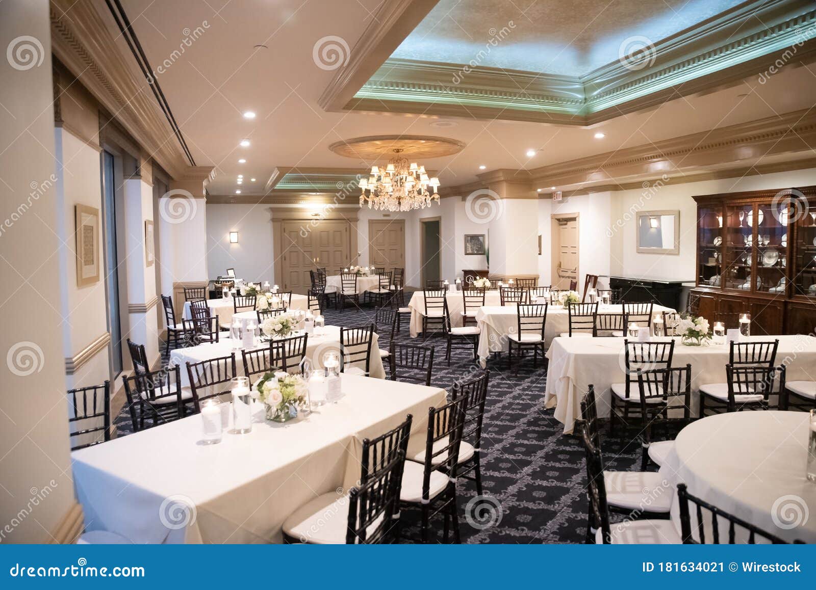 Beautiful Wedding Hall with White Tables with Elegant Setting Stock ...