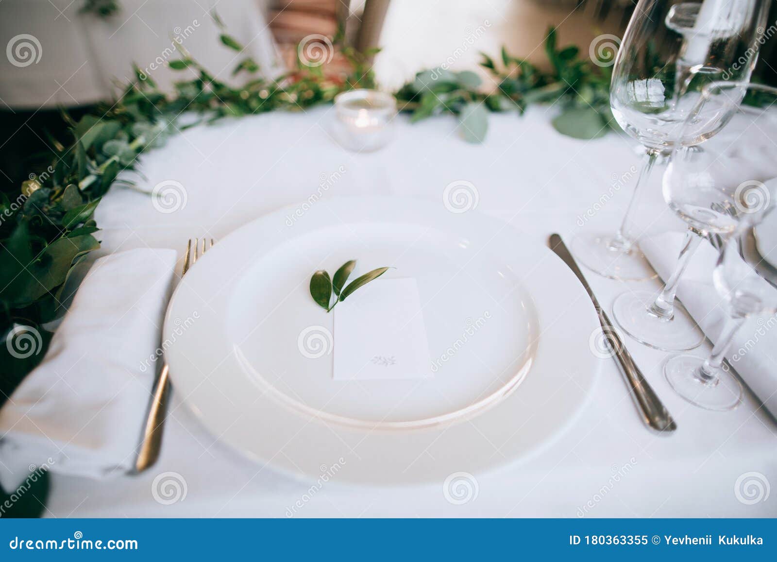 Beautiful Wedding Table Setting. White Plates on White Tablecloth Stock ...