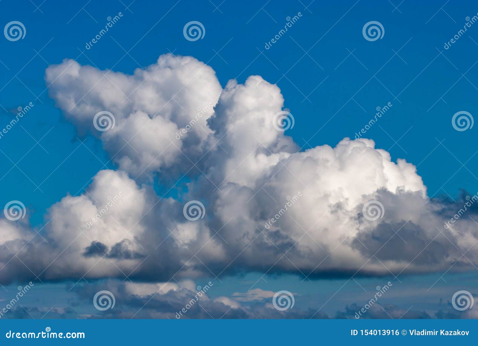 Beautiful White Fancy Clouds Illuminated by the Sun on a Blue Sky ...