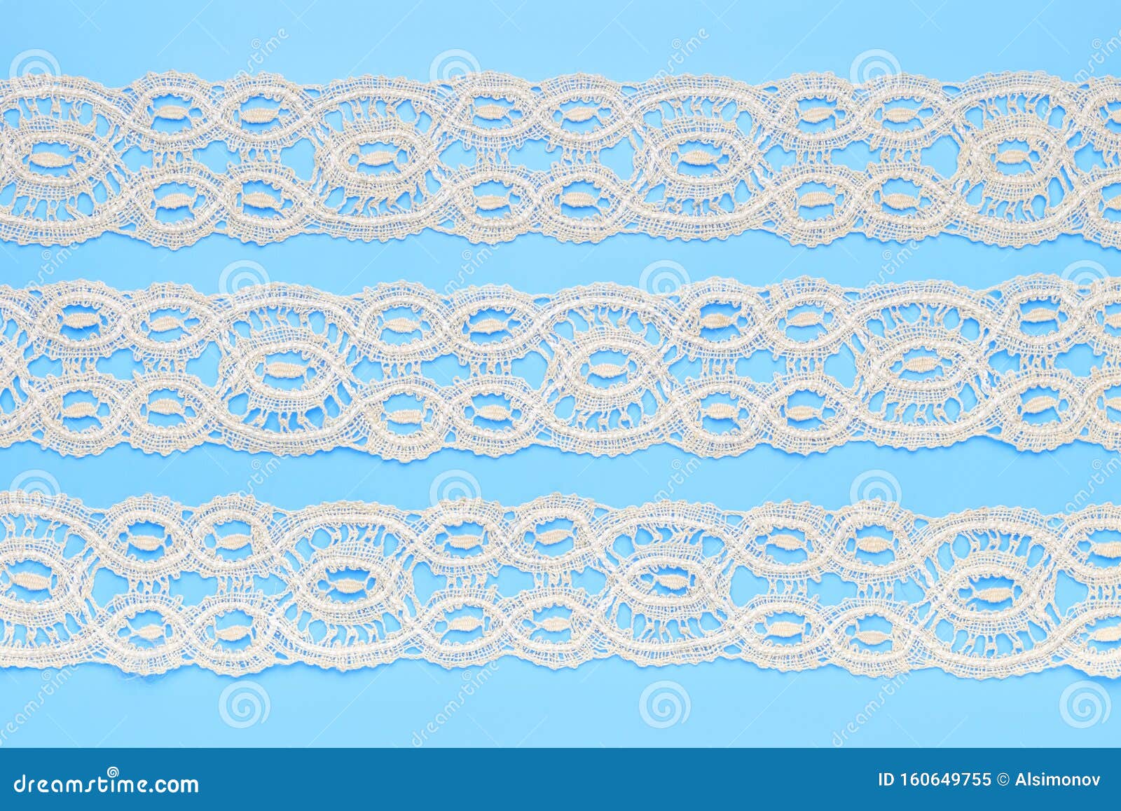 Beautiful White Lace on Light Blue Background. Stock Image - Image of ...