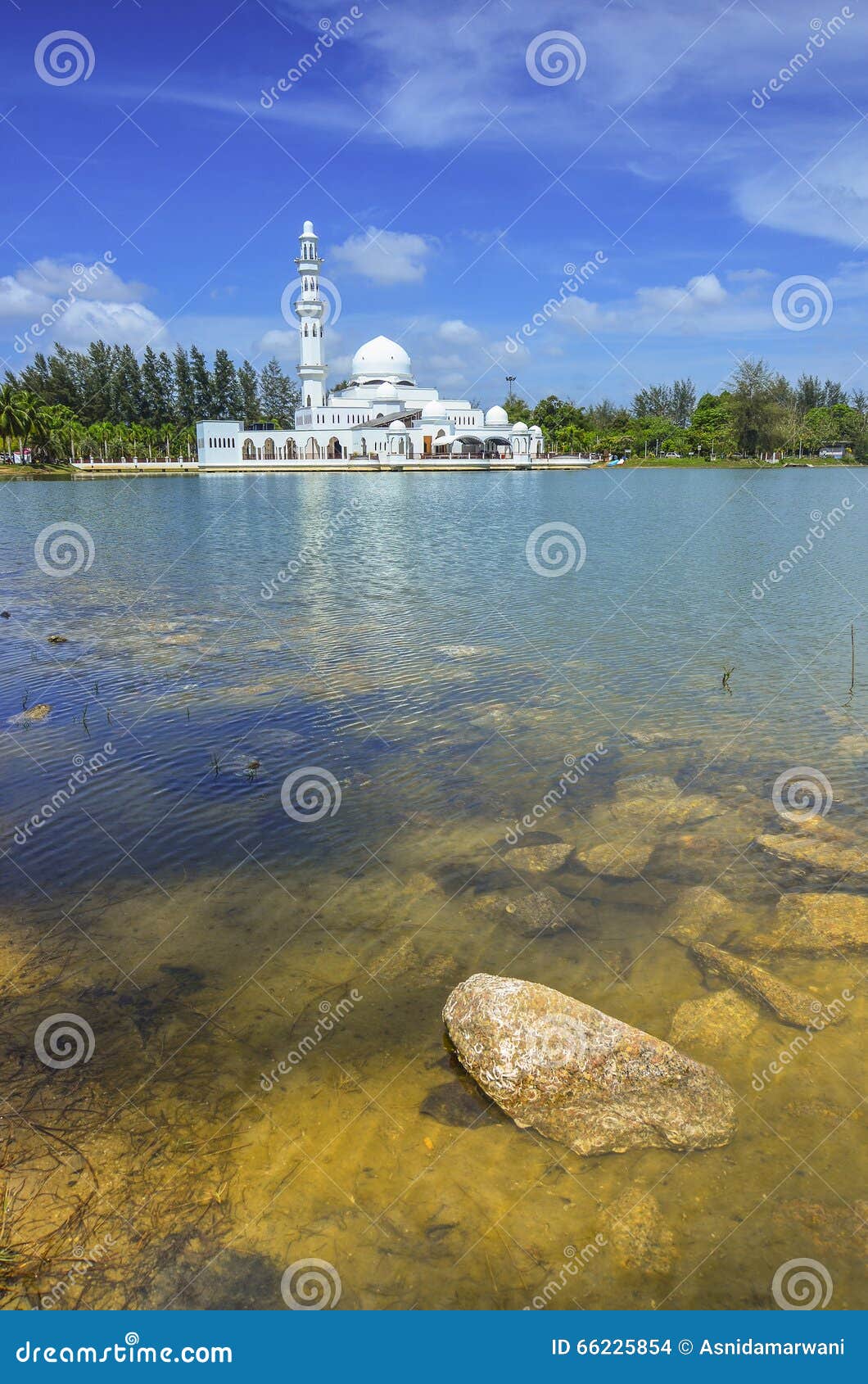 Beautiful White Mosque with Reflection in the Lake during Clean Blue ...