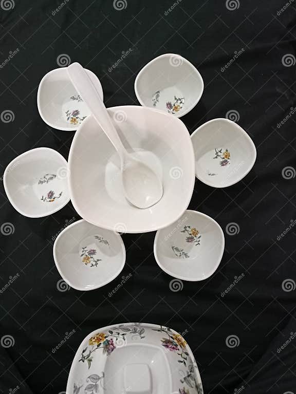 A Beautiful White Pudding Set with Flowers Designed Stock Image - Image ...
