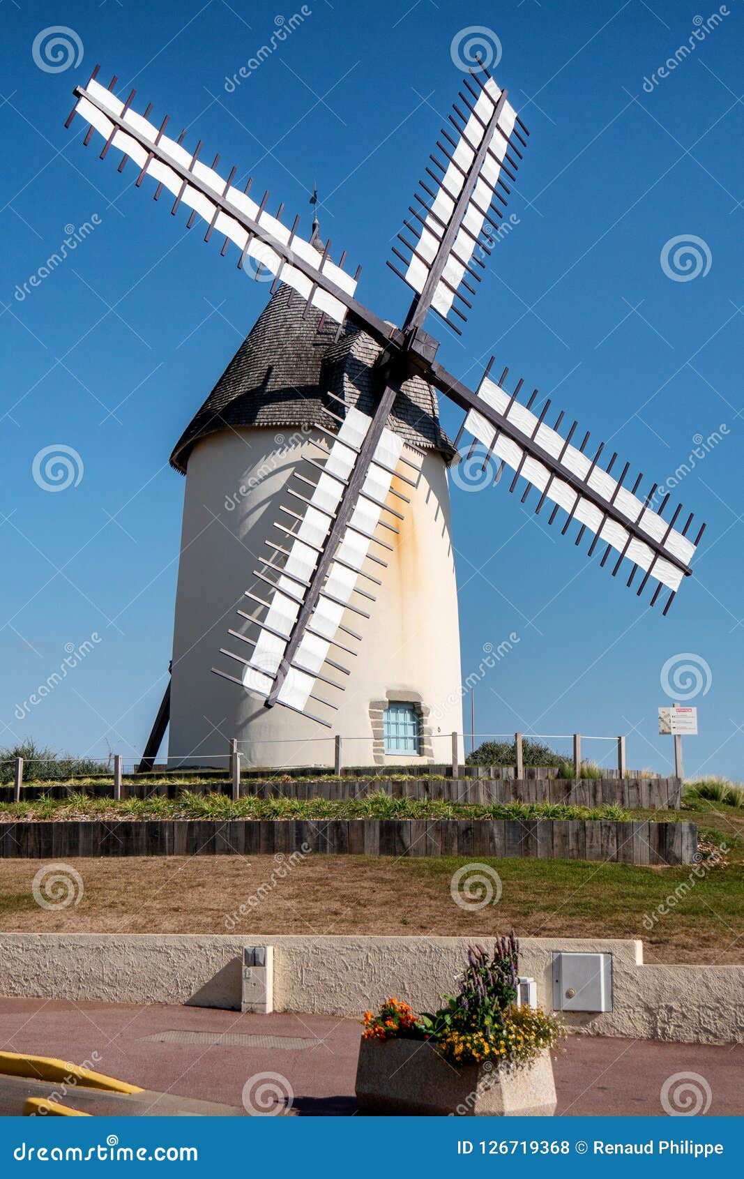 Beautiful White Windmill, the Background of Blue Sky. Stock Photo ...