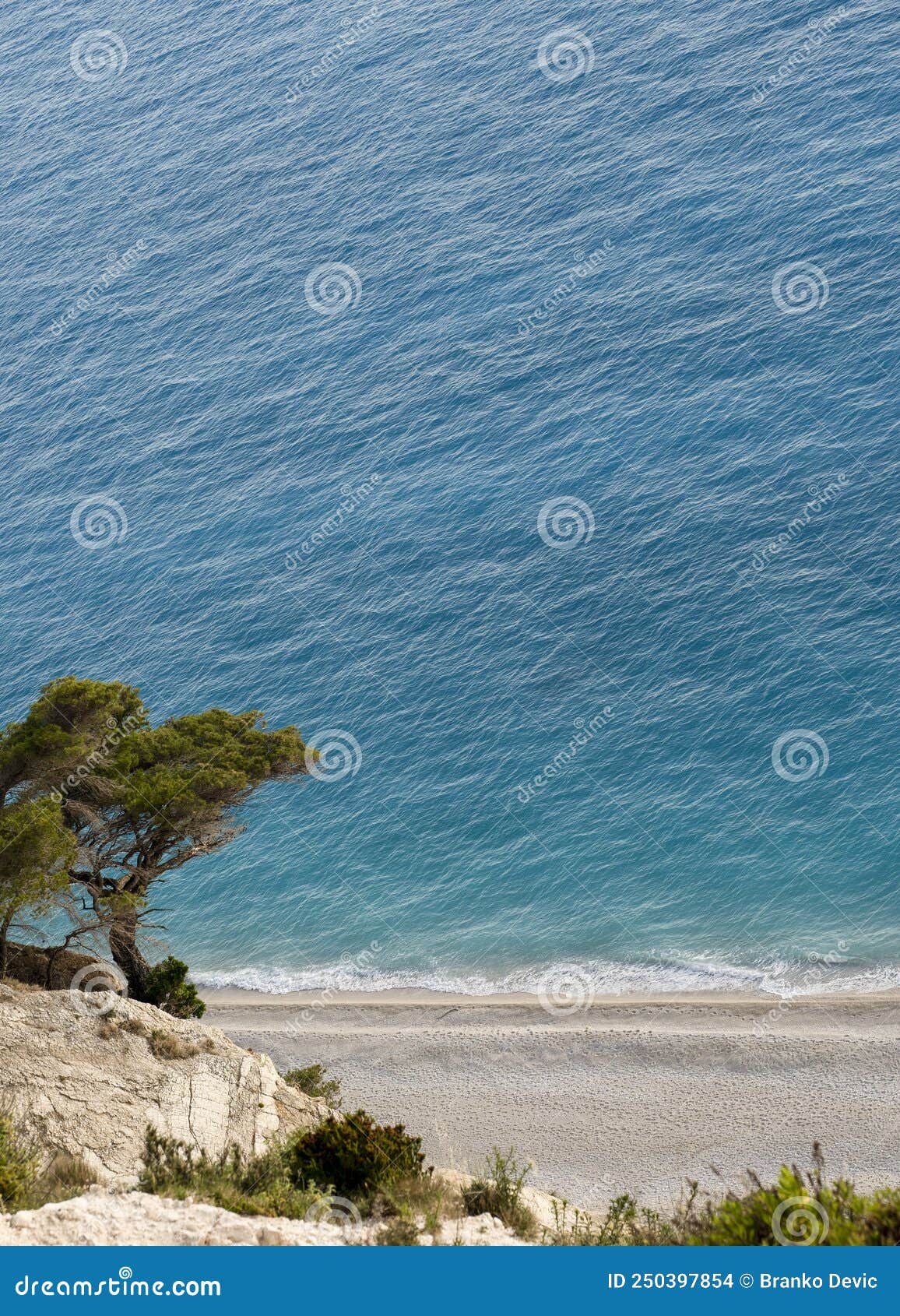 Beautiful Wild Mediterranean Pebble Beach Under a Large Cliff Stock ...