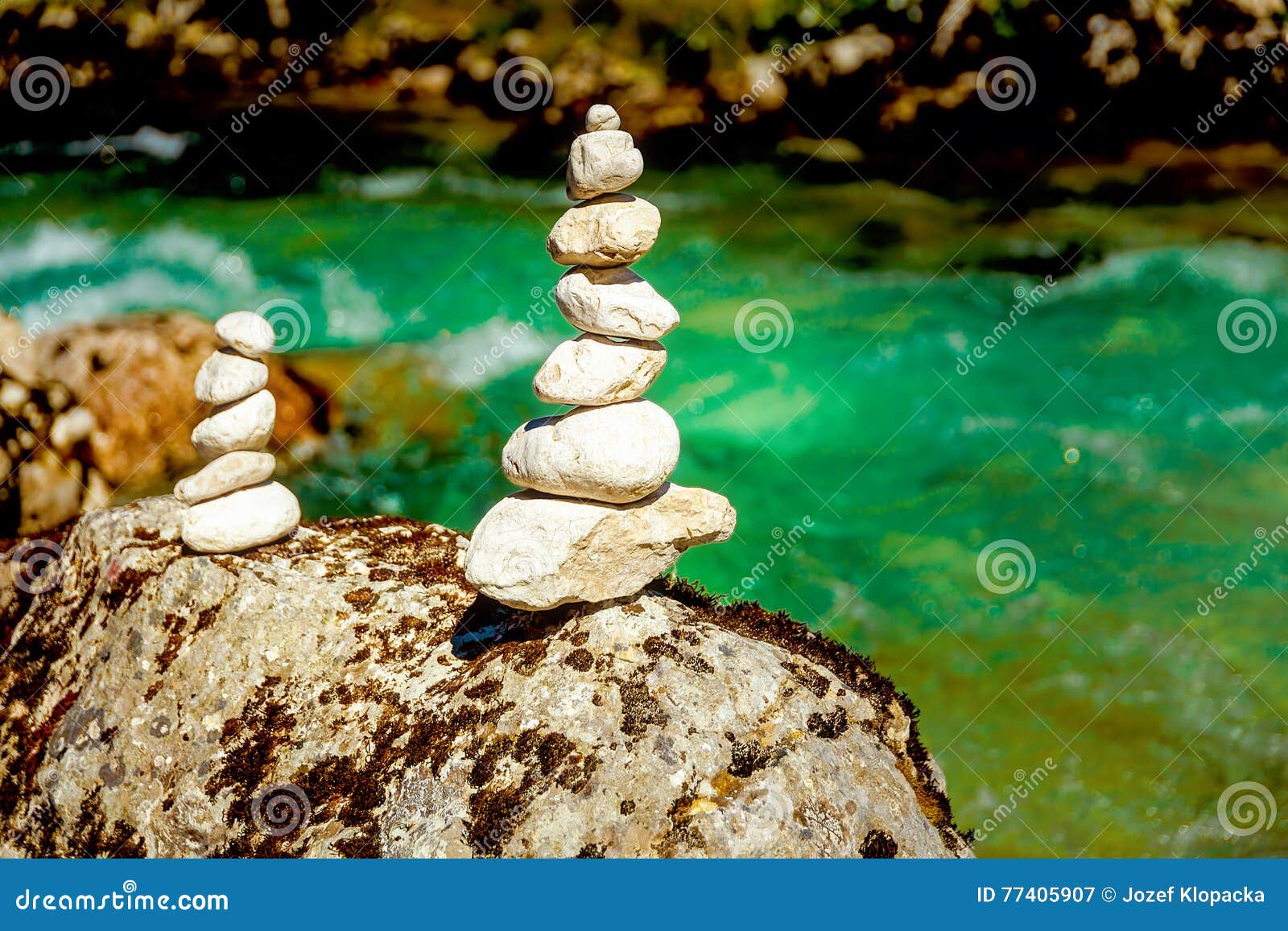 Beautiful Wild River with Turquoise Water and Stack of Stone Piles ...