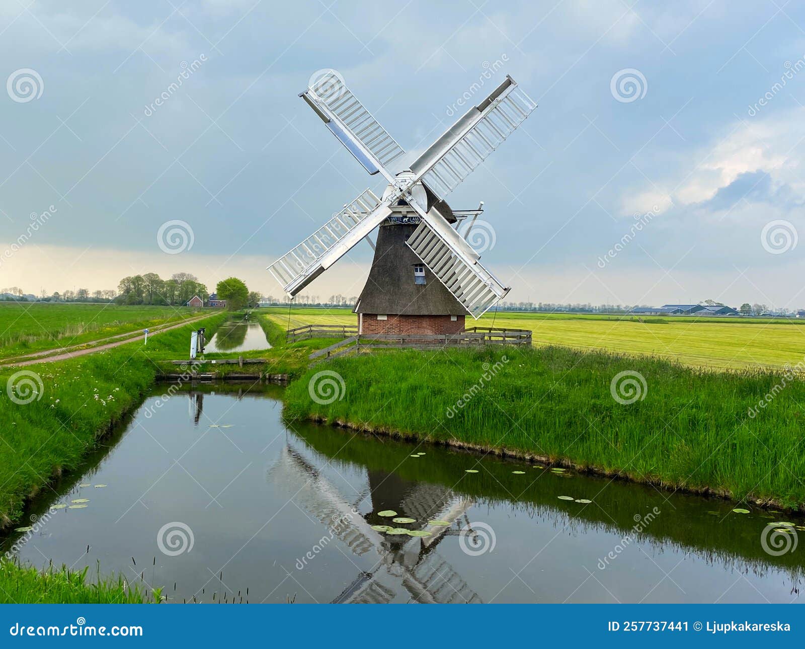 Windmill the Netherlands stock image. Image of clouds - 257737441