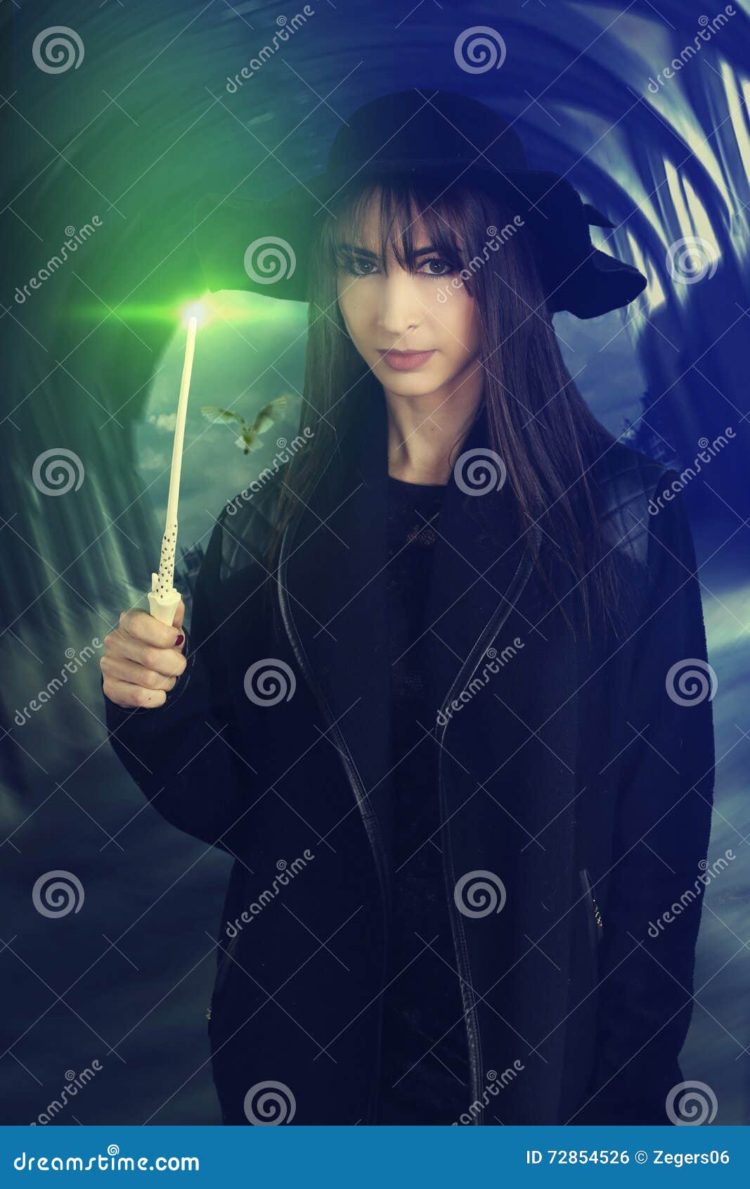 Beautiful Witch Holding a Magic Wand Stock Photo - Image of light ...