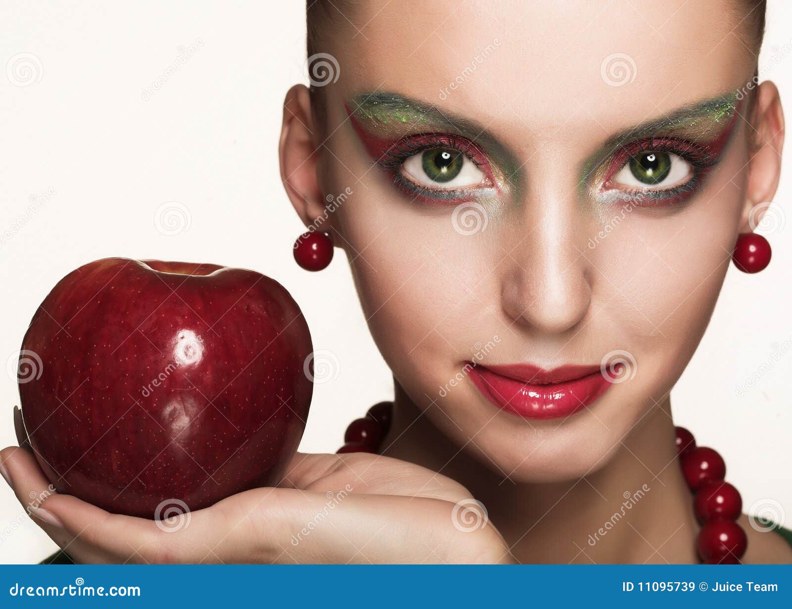 Beautiful woman with apple stock image. Image of lips - 11095739