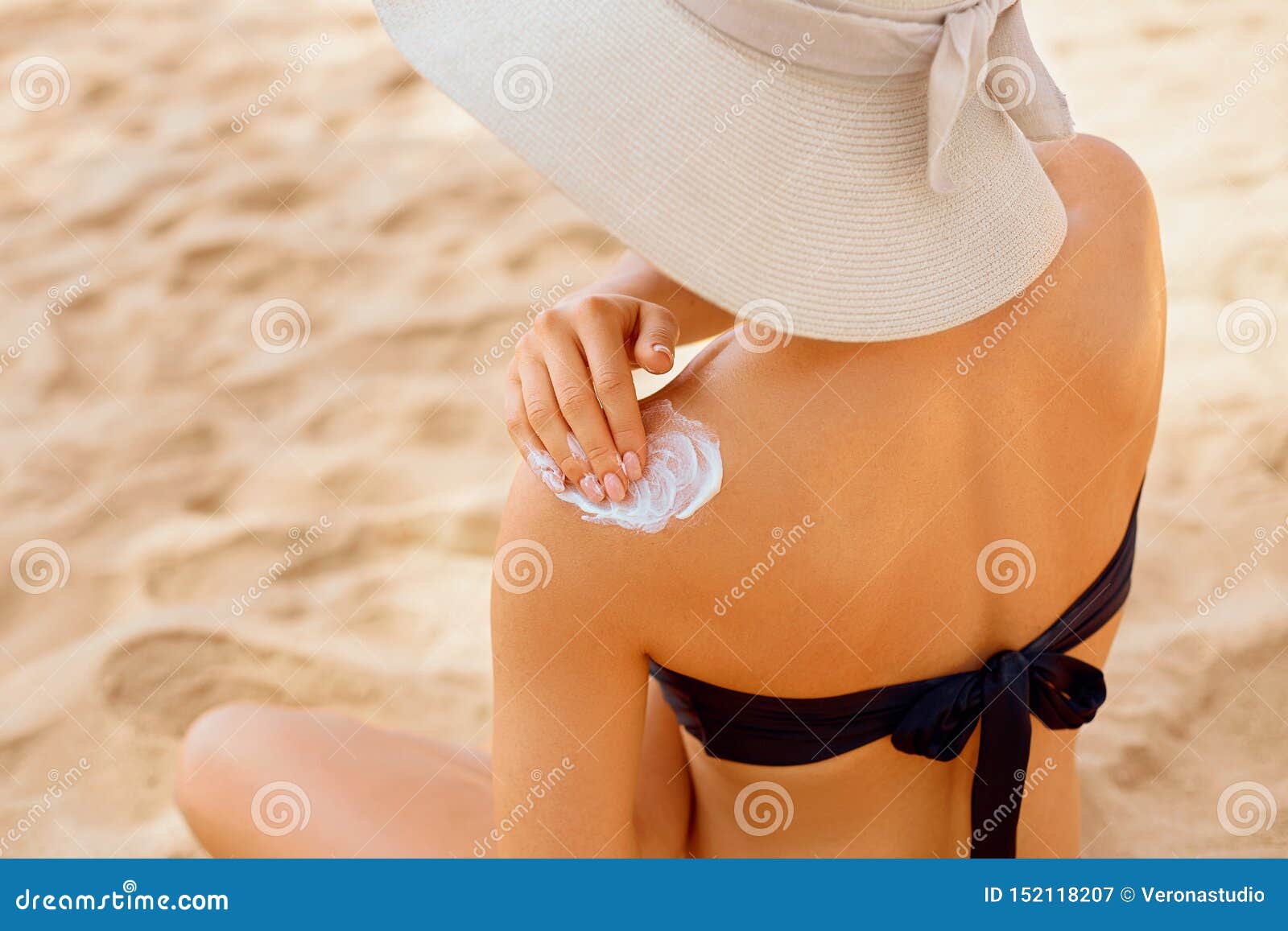 Beautiful Woman Apply Sun Cream On Tanned Back Skin And Body Care Sun
