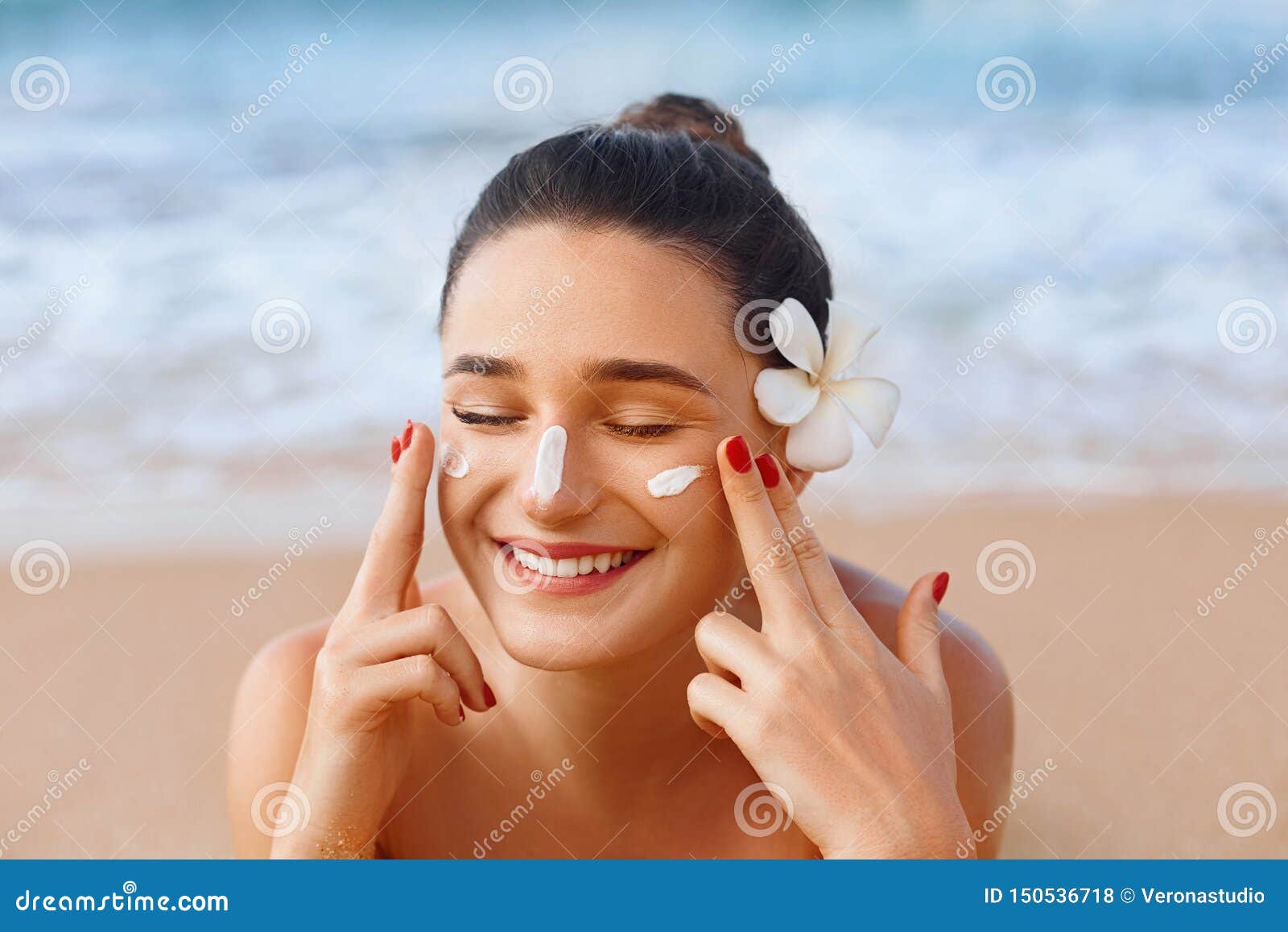 Beautiful Woman Applying Cream Sunscreen On A Tanned Face Sunscreen
