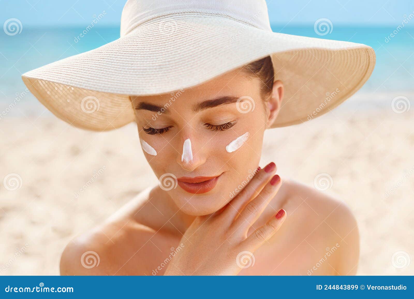 Beautiful Woman Applying On Beautiful On Face Sunscreen Solar Cream
