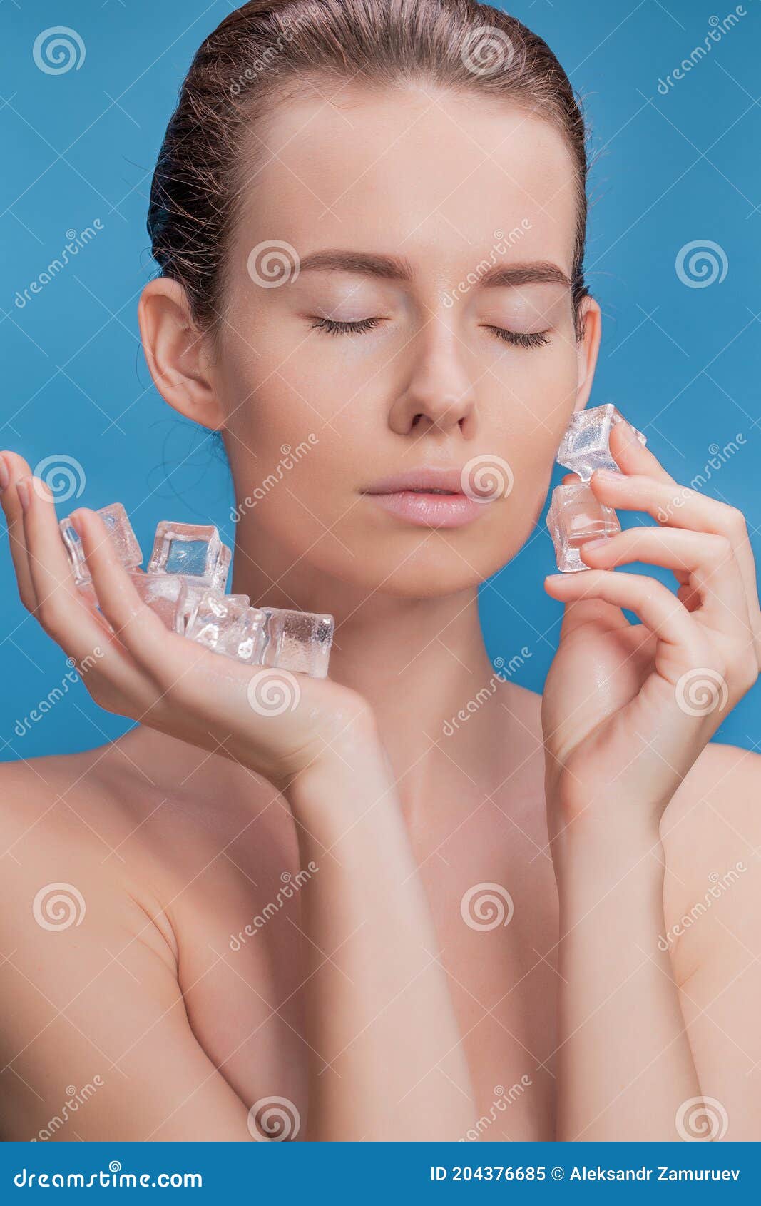 Beautiful Woman Applying Ice Cube Treatment on Blue Background Stock ...