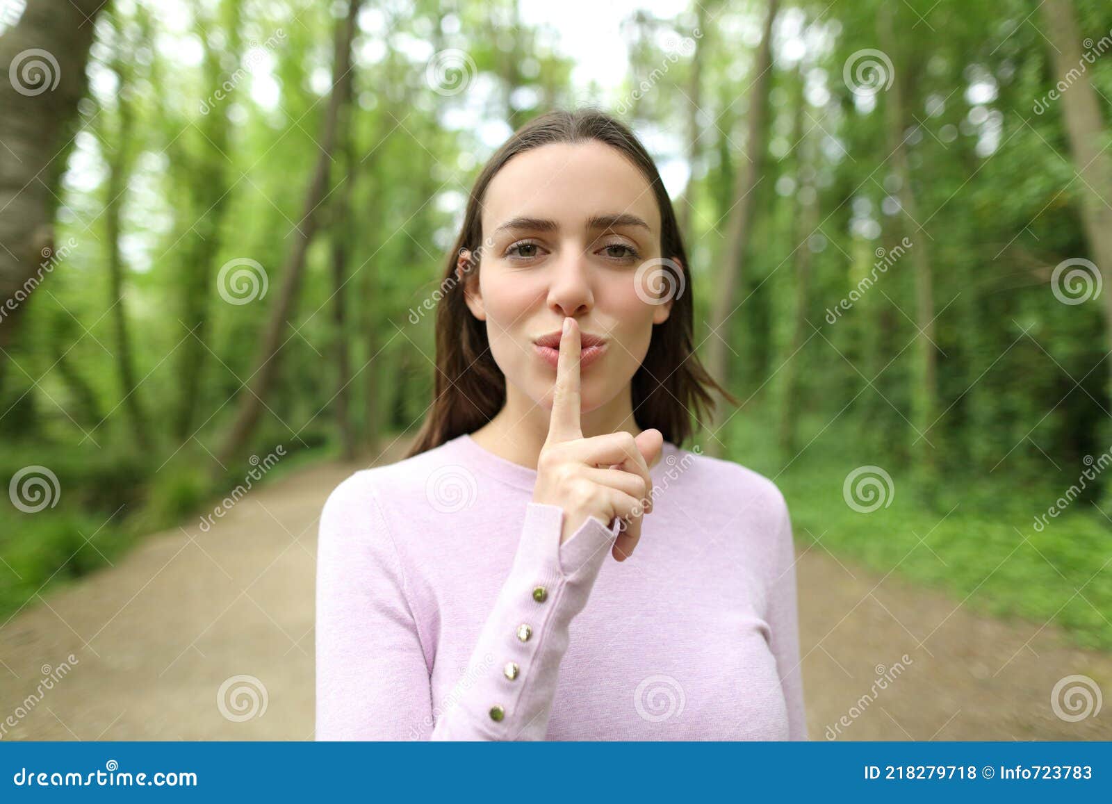 Beautiful Woman Asking for Silence in a Forest Stock Photo - Image of ...
