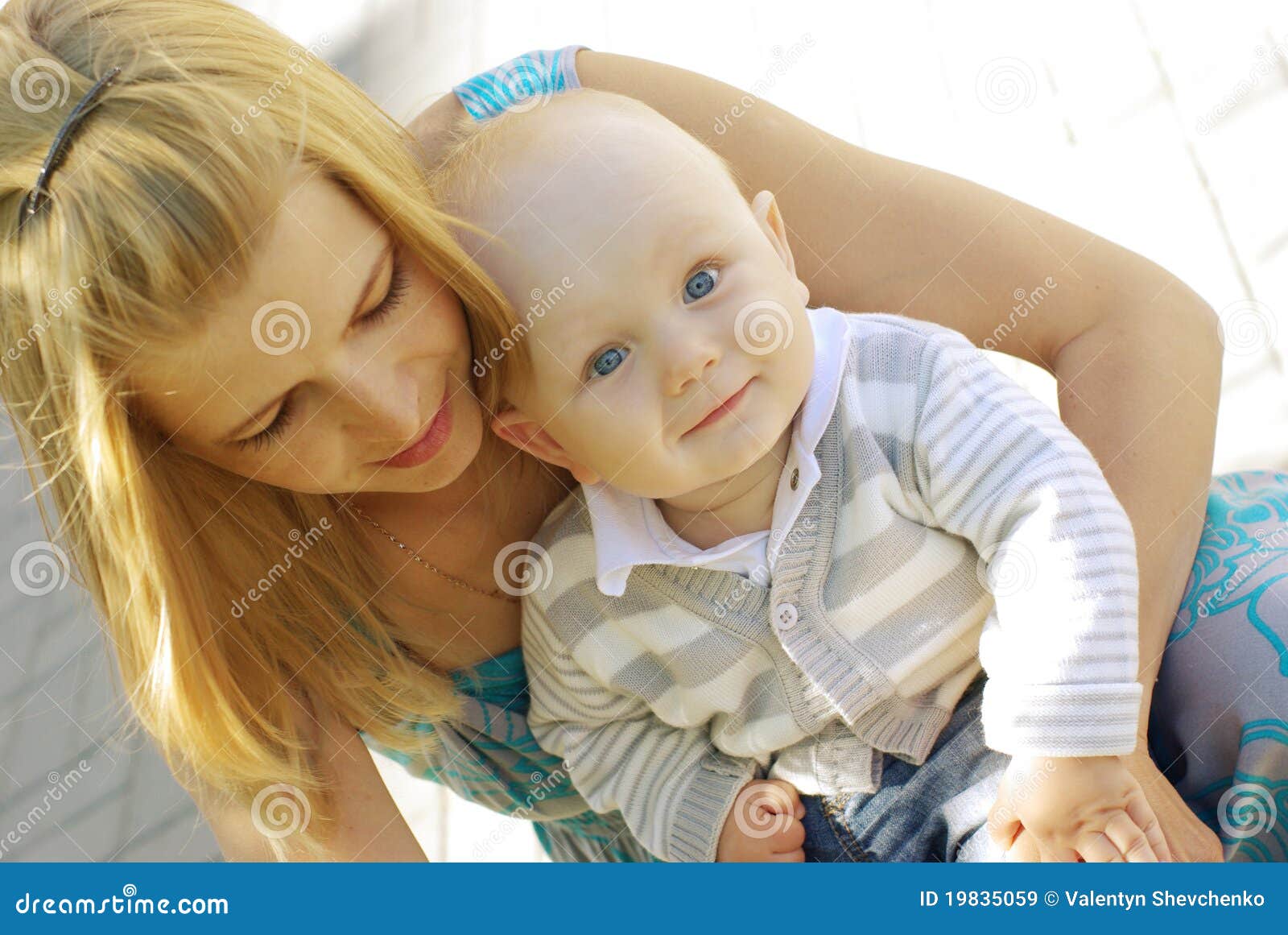 Beautiful woman and baby stock image. Image of field - 19835059
