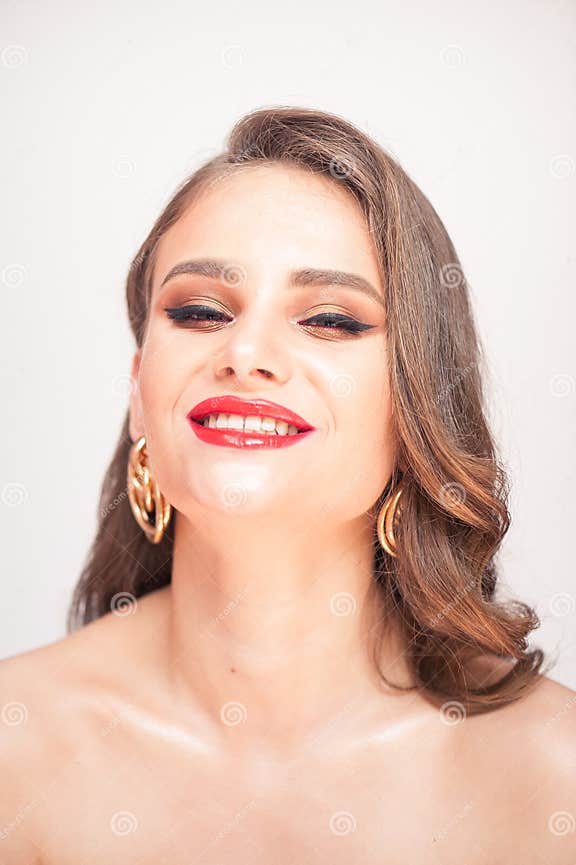 Beautiful Woman With Beauty Makeup On Face Red Lipstick On Lips And
