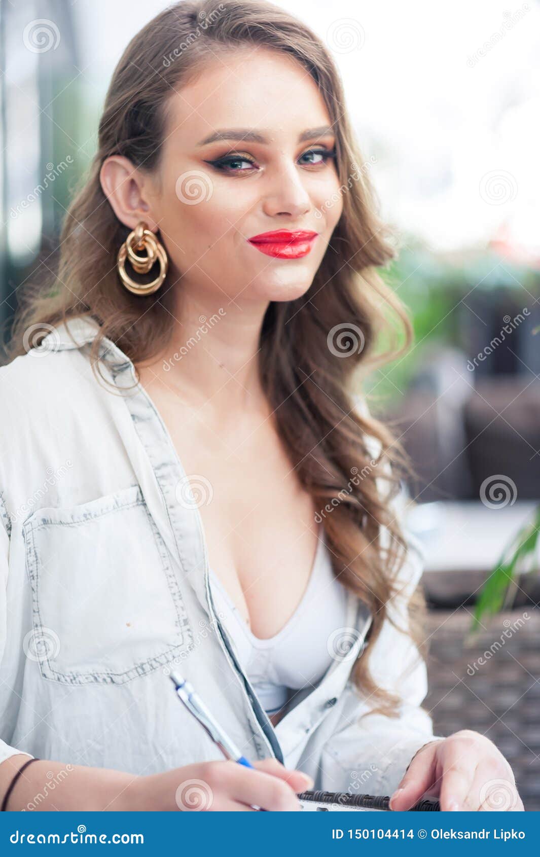 Beautiful Woman With Beauty Makeup On Face Red Lipstick On Lips And