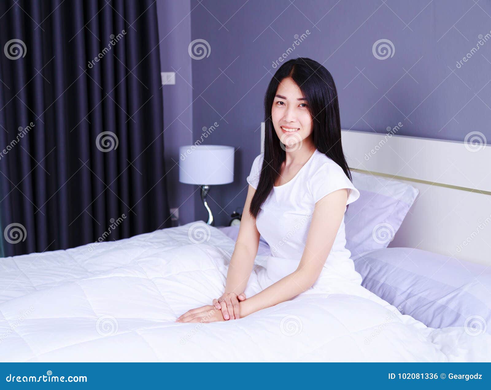 Beautiful Woman on Bed in Bedroom Stock Photo - Image of indoor, cute ...
