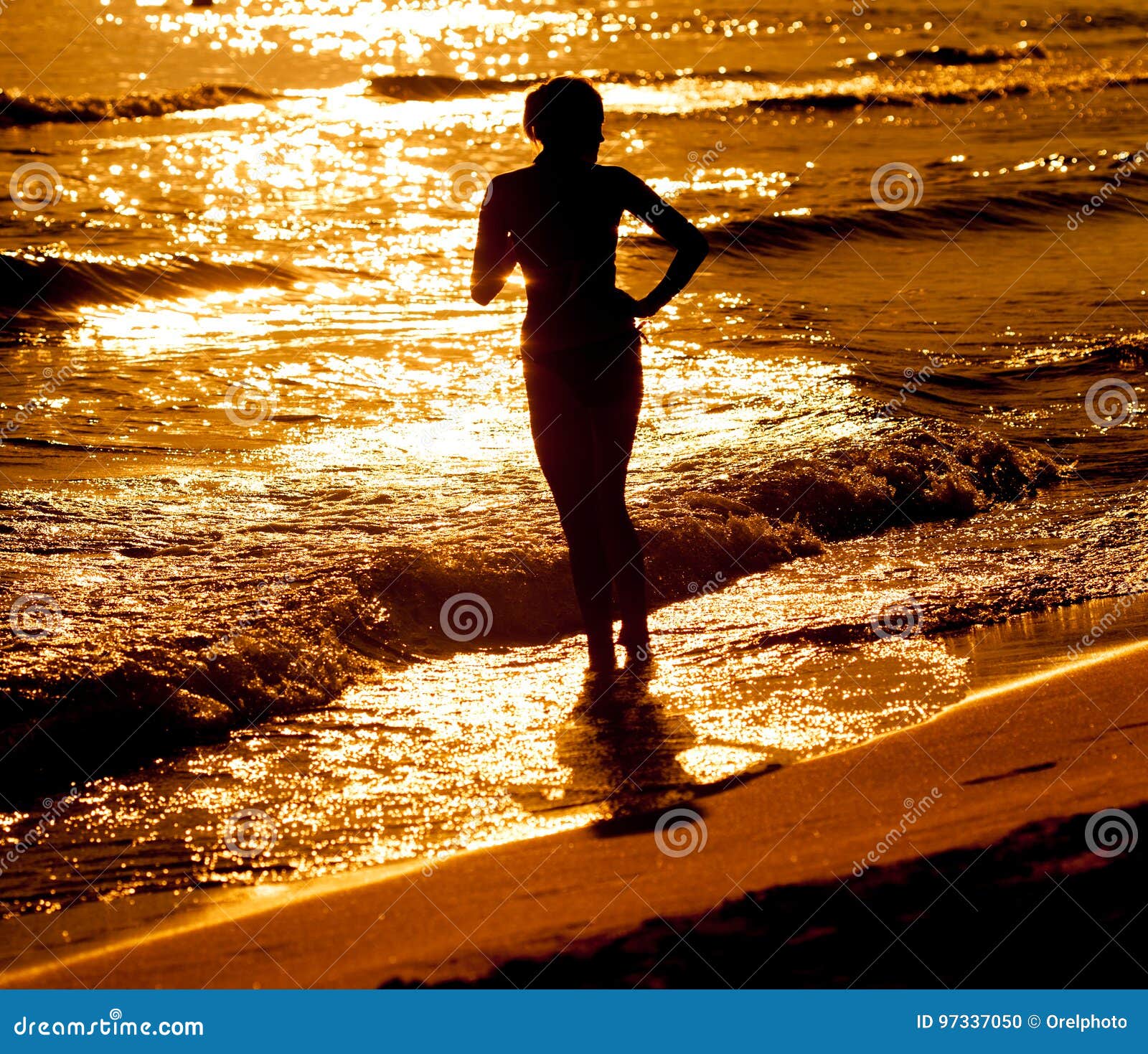 Beautiful Woman in Bikini at Beach on Sunsets Stock Photo - Image of ...