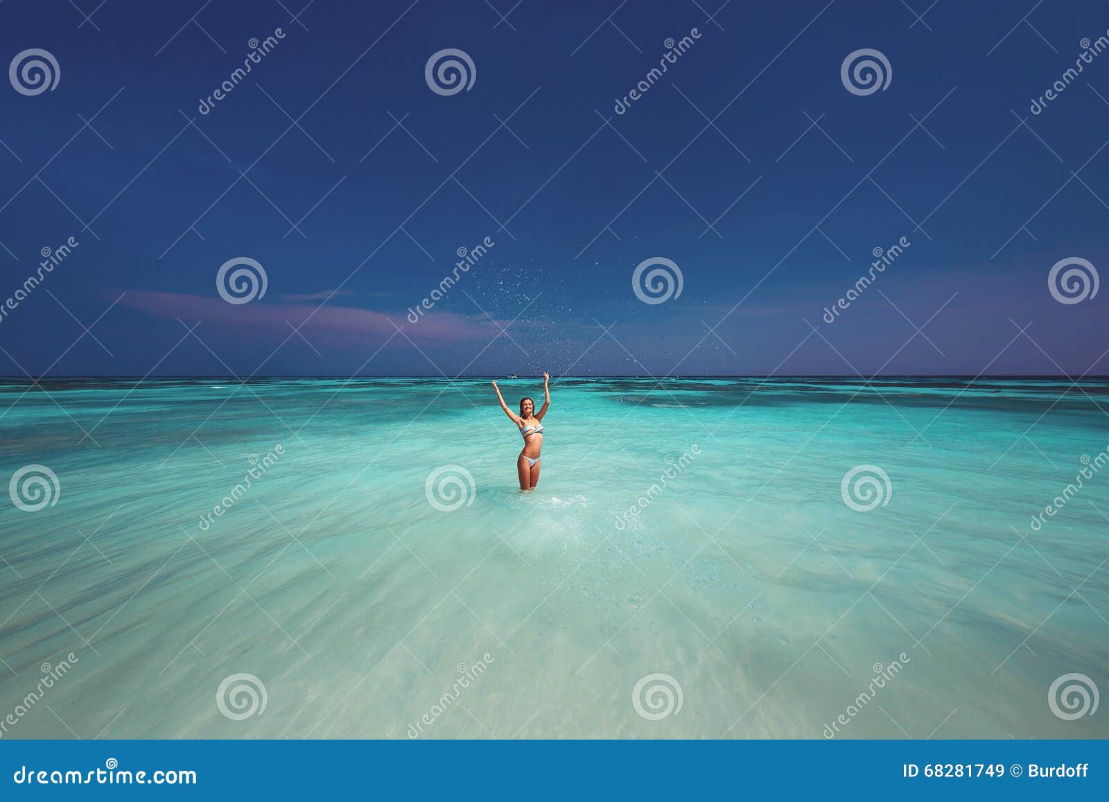 Beautiful Woman In Bikini Splashing Water In Sea Stock Image Image Of