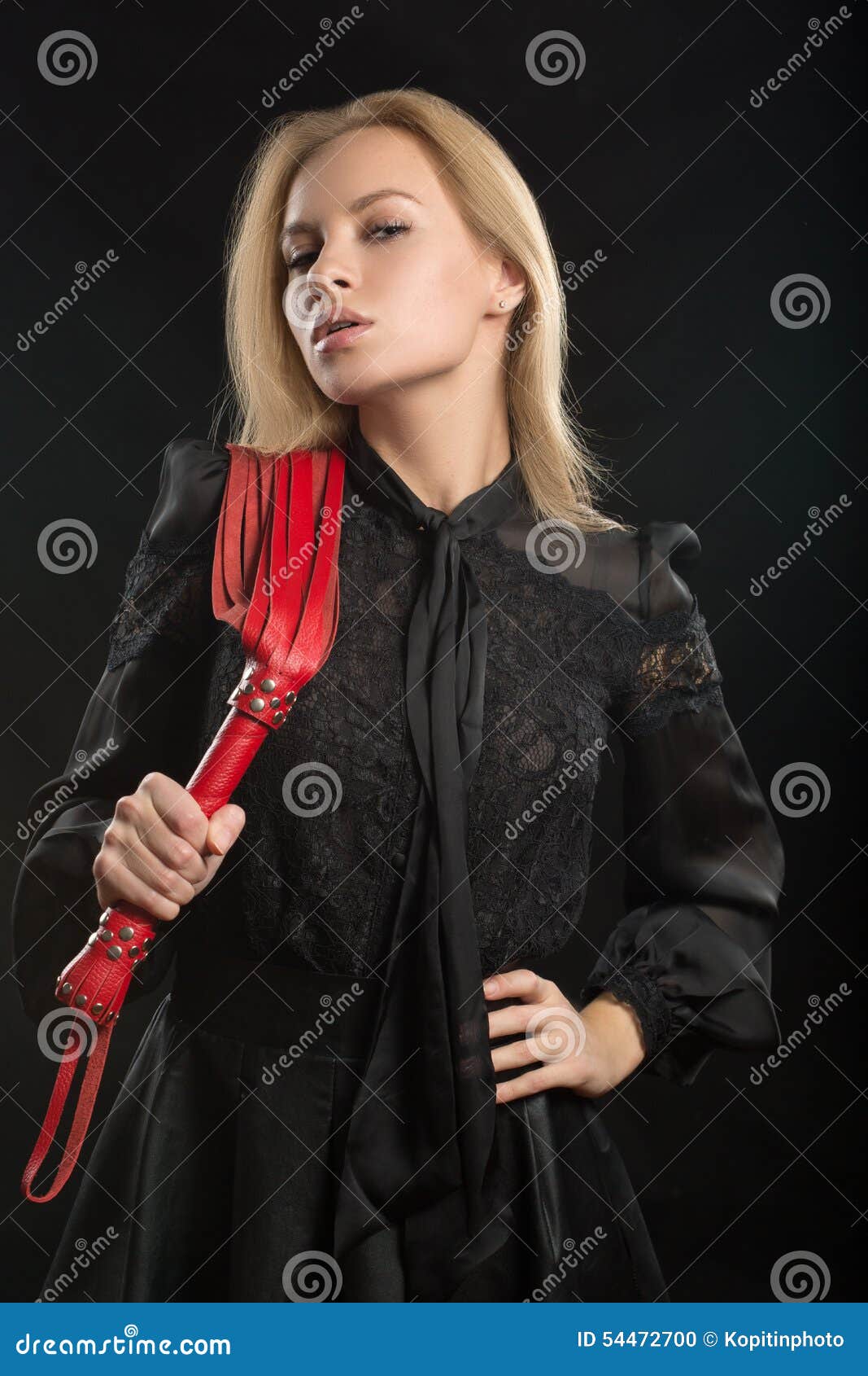 Beautiful Woman in Biting Red Whip Stock Photo - Image of blond, female ...