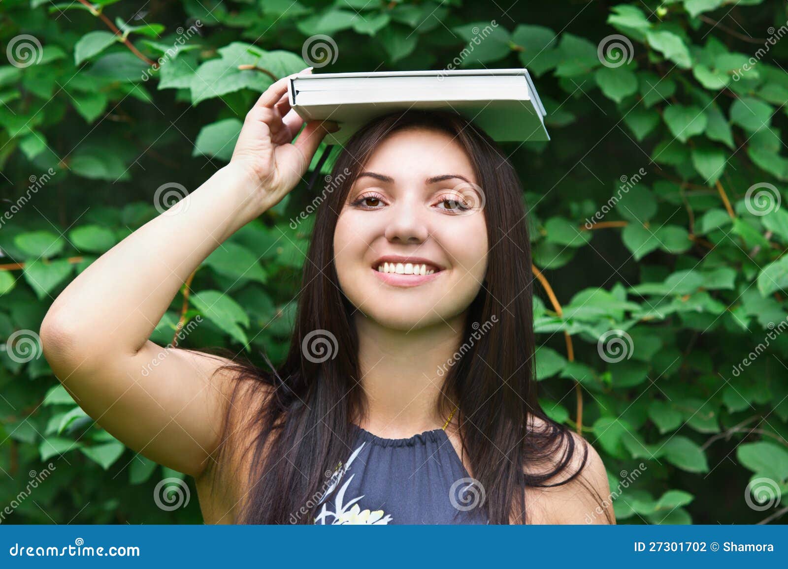 Beautiful Woman with a Book on Her Head Stock Photo - Image of happy ...