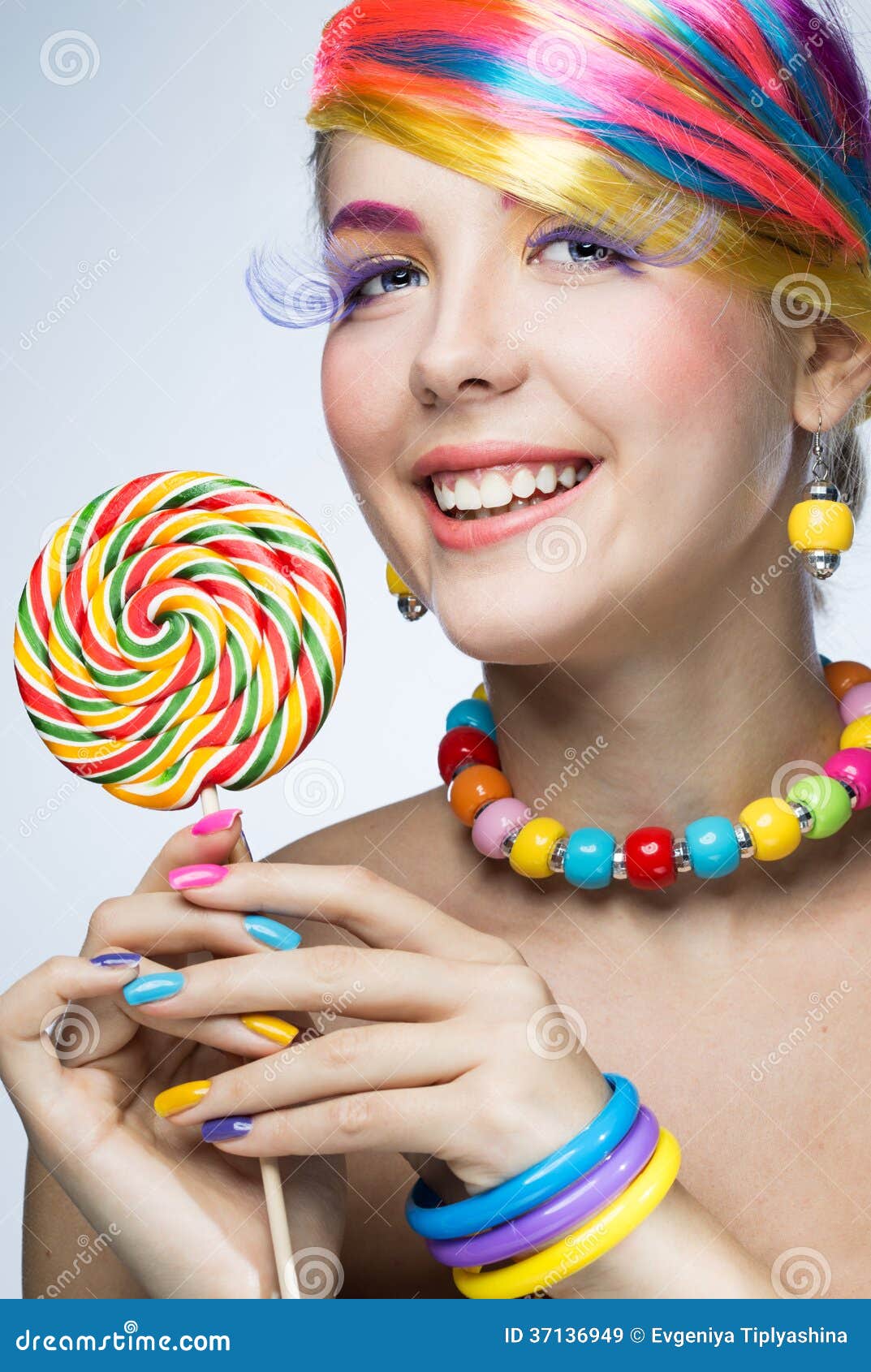 Beautiful woman with candy stock image. Image of model - 37136949