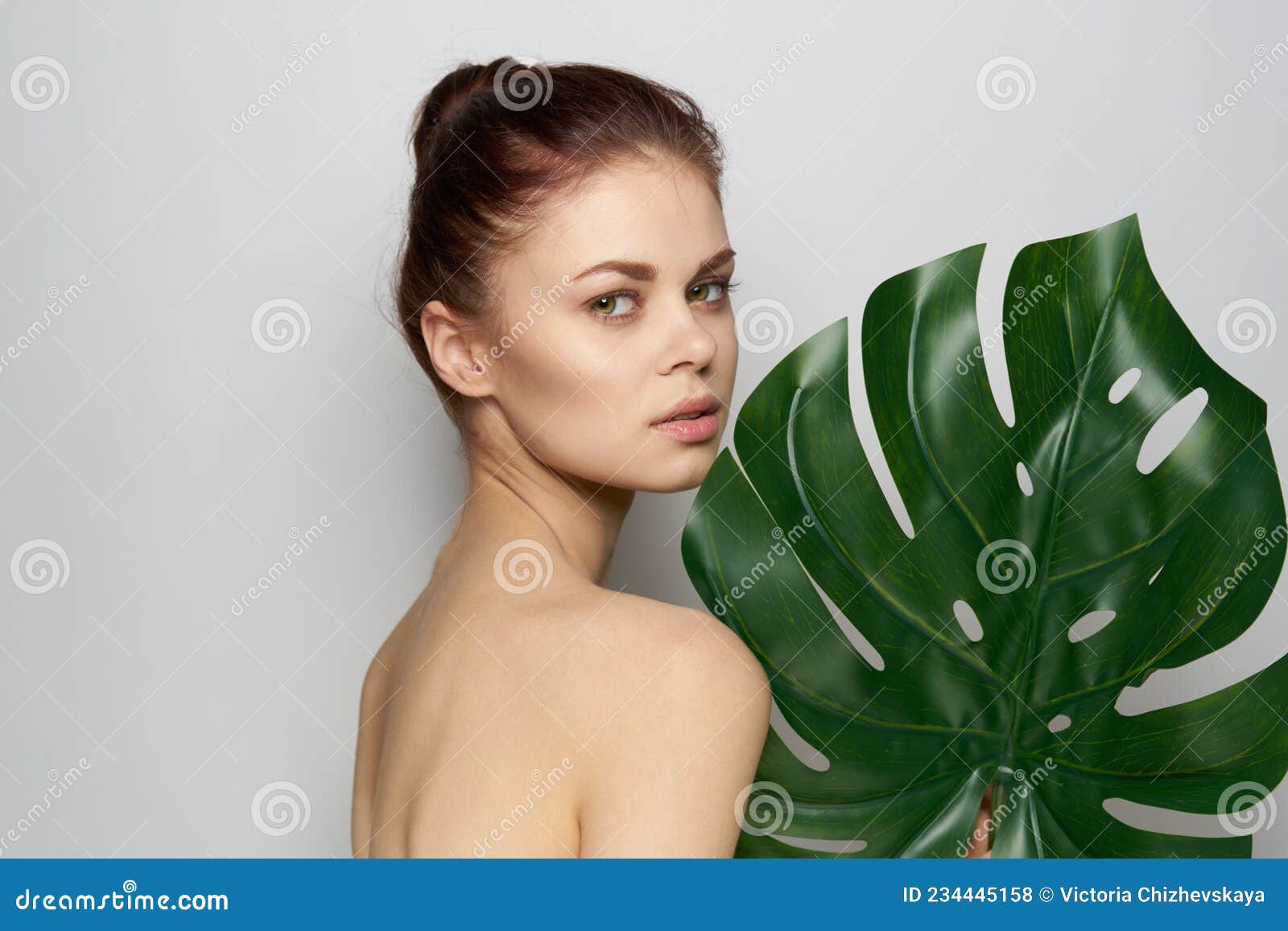 Beautiful Woman Clean Skin Palm Leaf Cosmetics Spa Treatments Stock