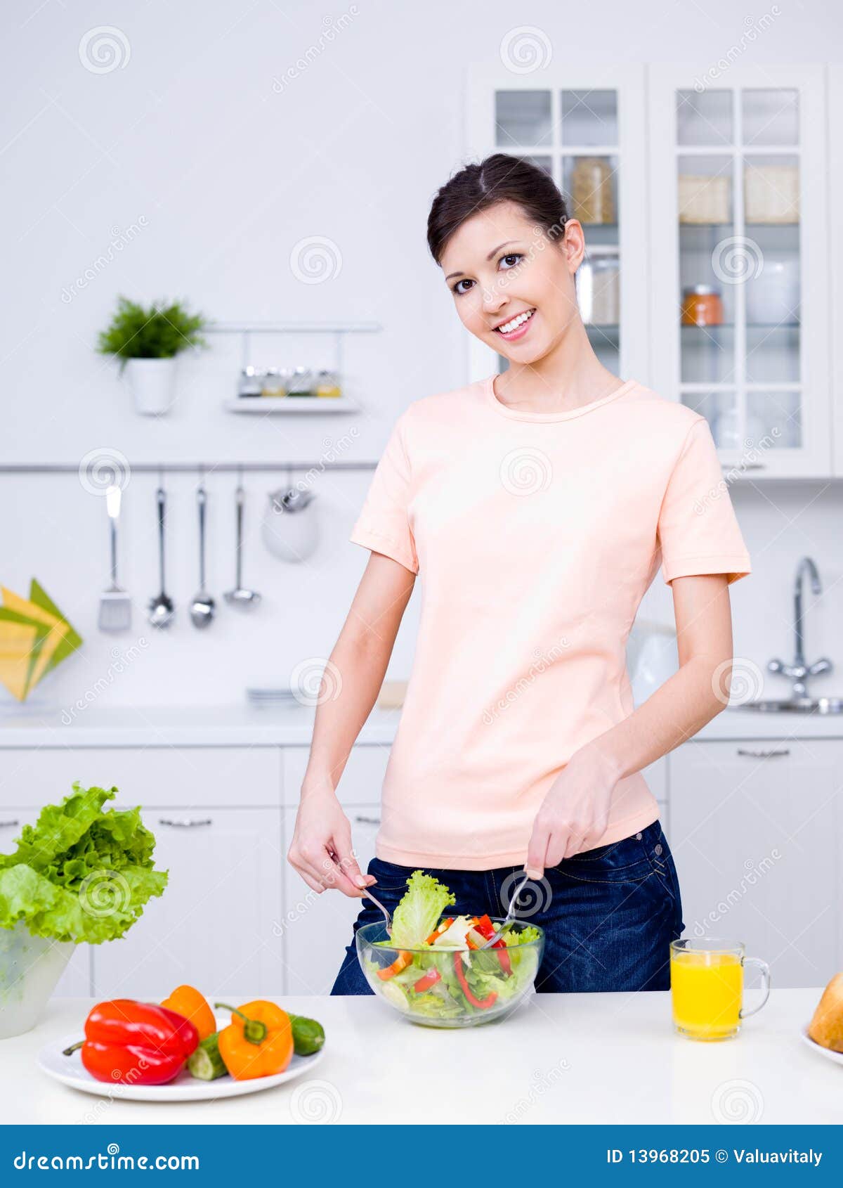 Beautiful woman cooking stock image. Image of vegetable - 13968205