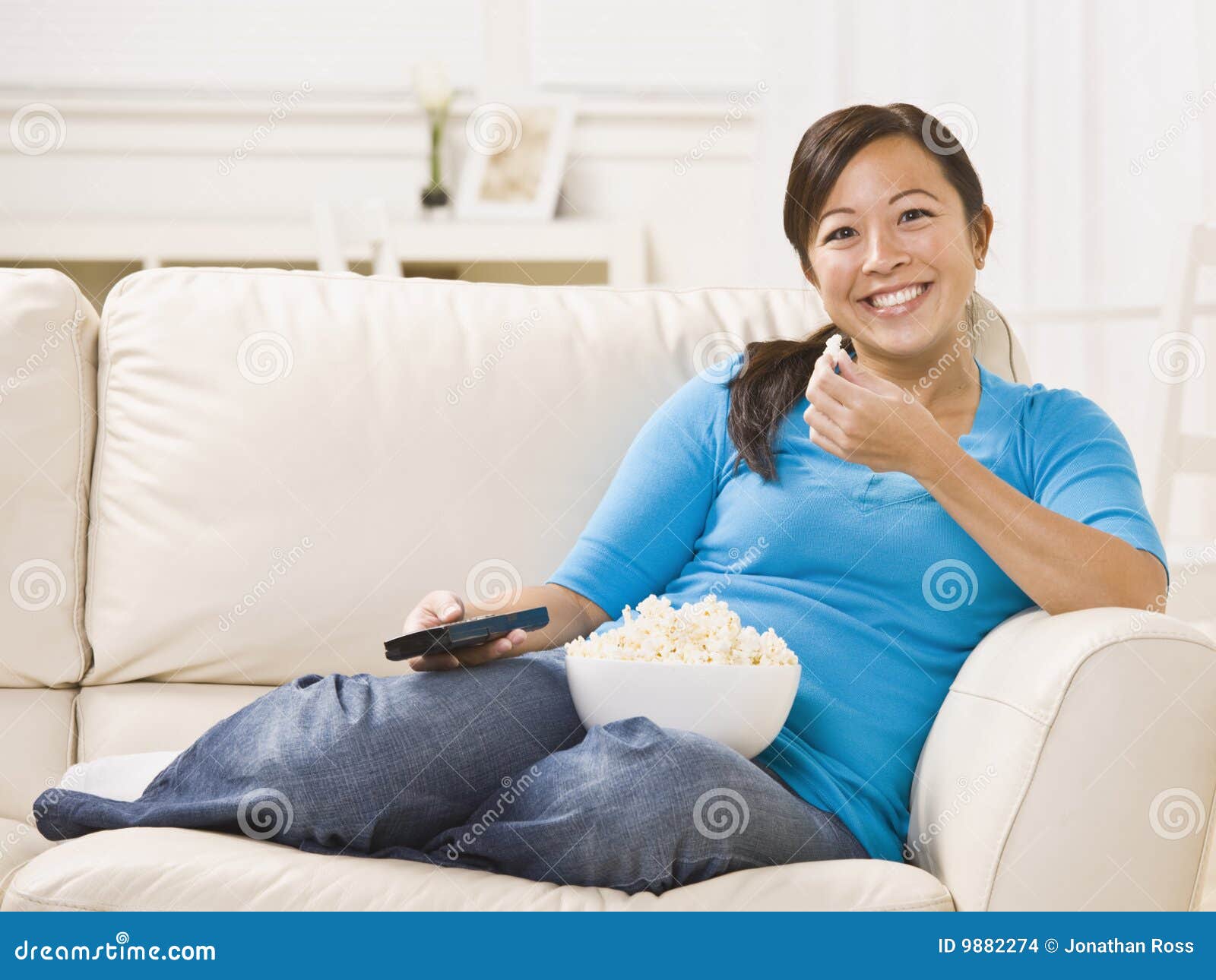 Beautiful Woman on the Couch Eating Popcorn Stock Photo - Image of home ...