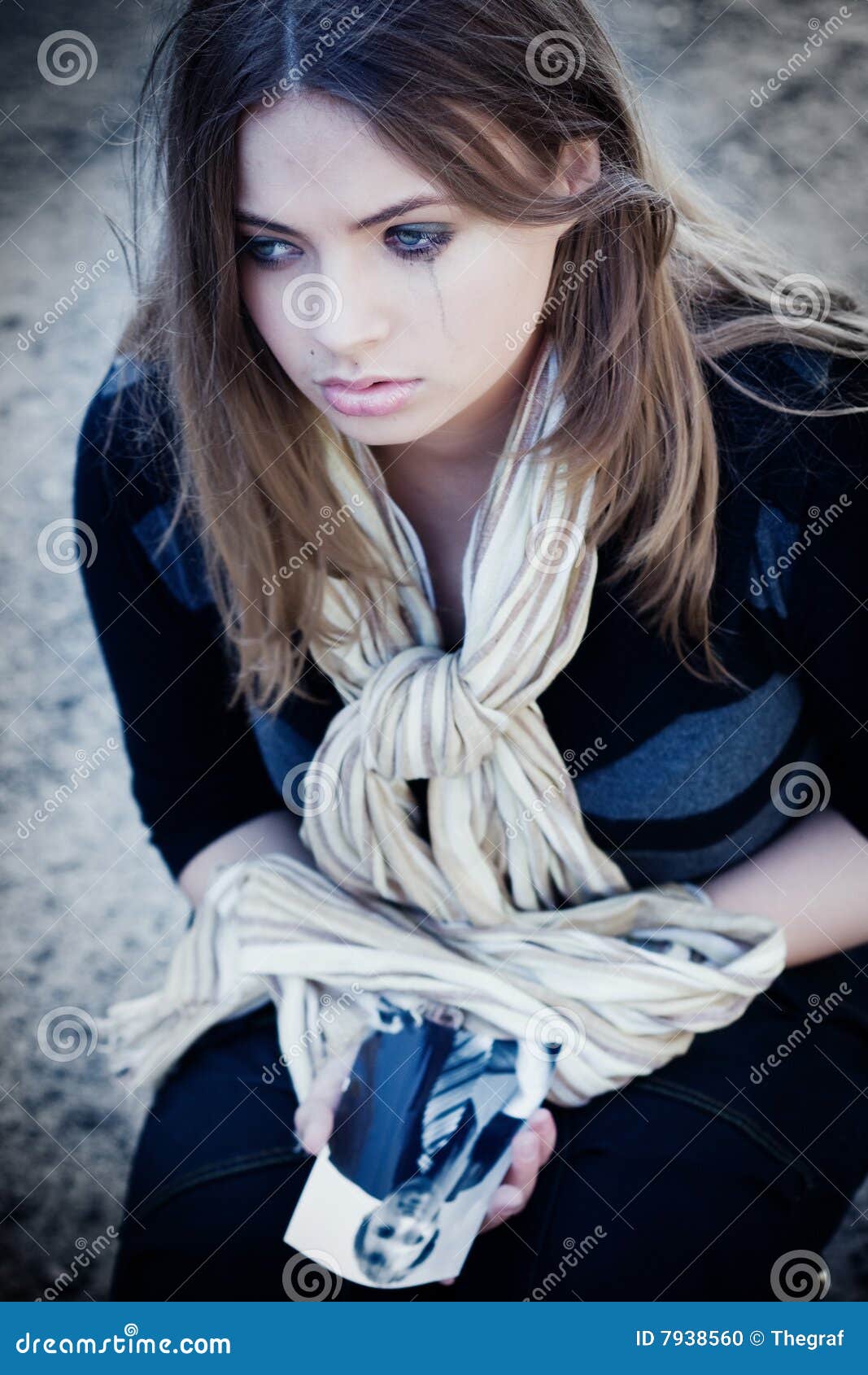 Photo Of Crying Student Girl Sitting At Desk With Exercise Books ...