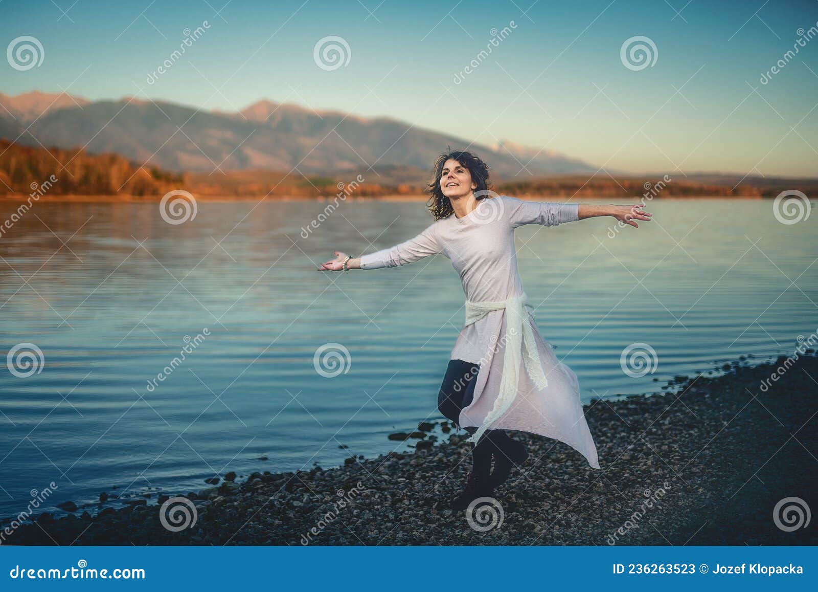 Beautiful Woman Dancing in Nature at Sunset. Stock Image - Image of ...