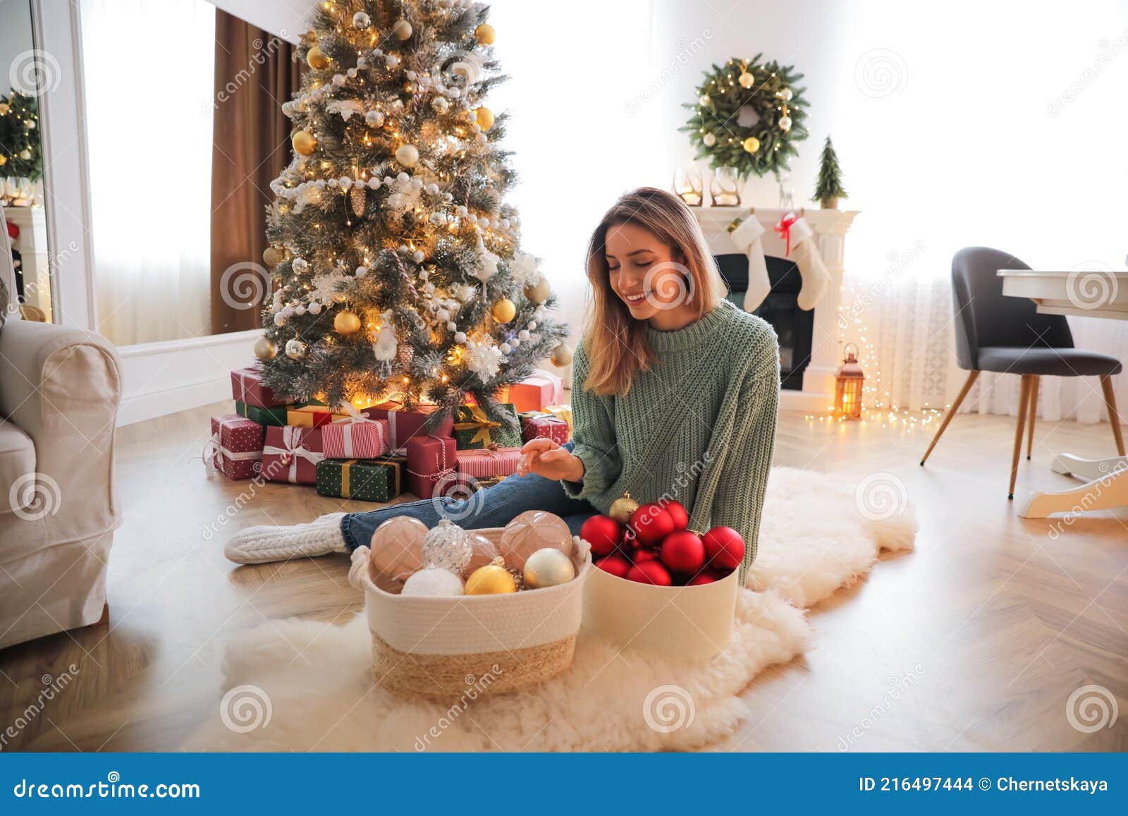 Beautiful Woman Decorating Christmas Tree at Home Stock Photo - Image ...