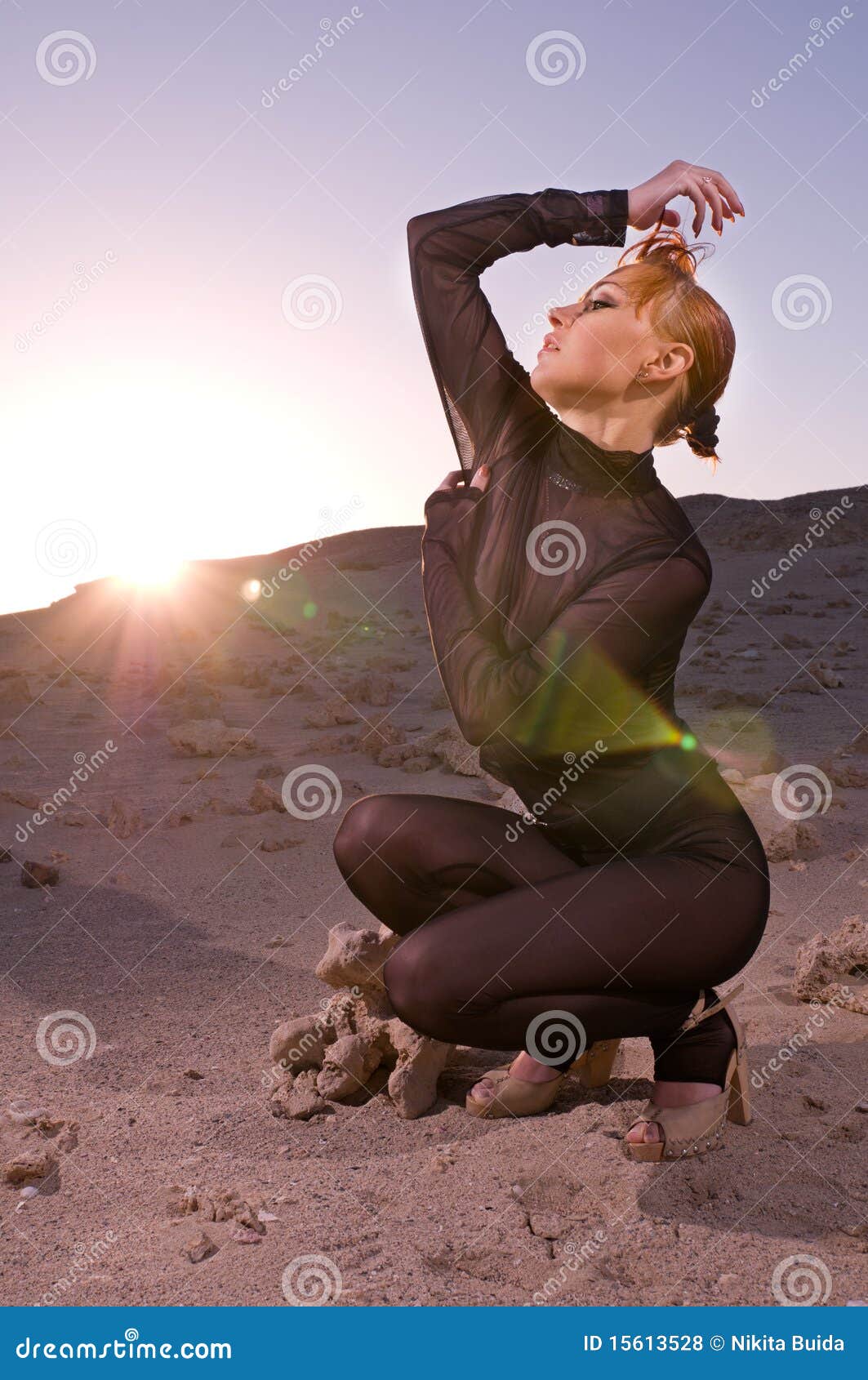 Beautiful woman in desert stock photo. Image of sitting - 15613528