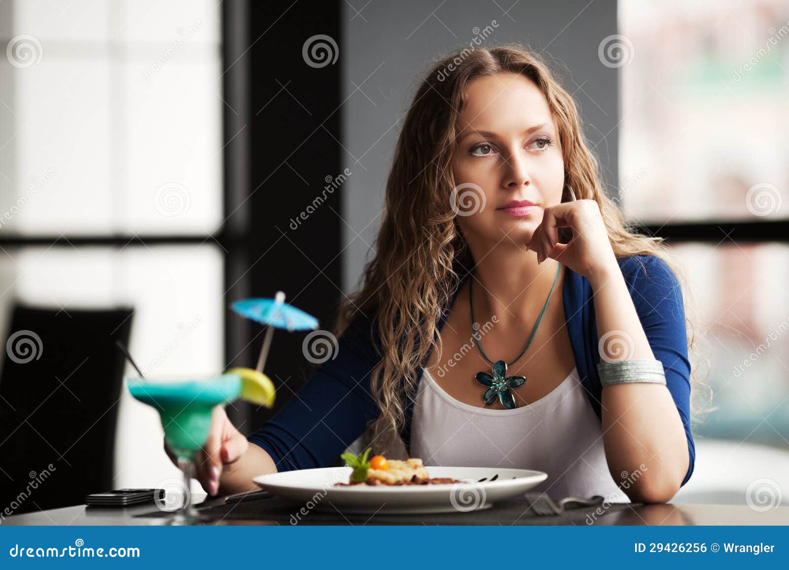 Beautiful Woman Dining at a Restaurant Stock Photo - Image of diner ...
