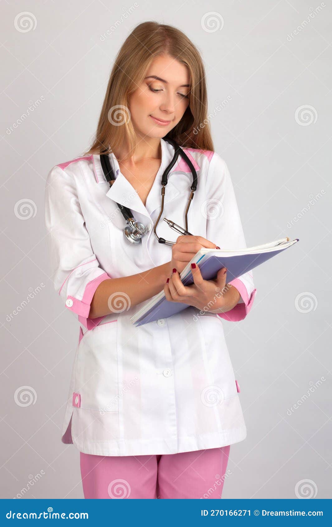 Beautiful Woman Doctor with a Stethoscope and . Journal for Notes Stock ...