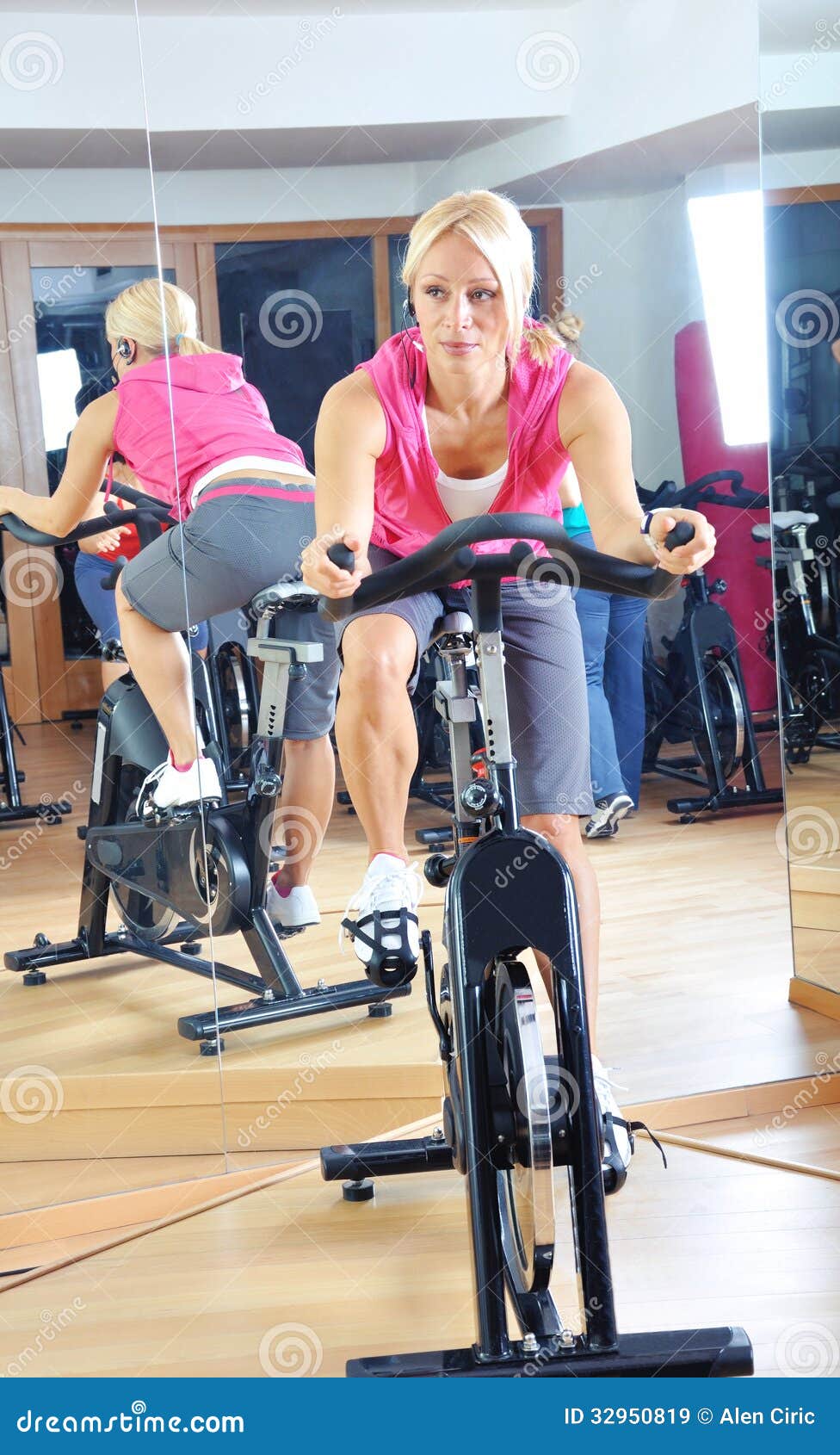 Beautiful Woman Doing Exercise in a Spinning Class Stock Image - Image ...