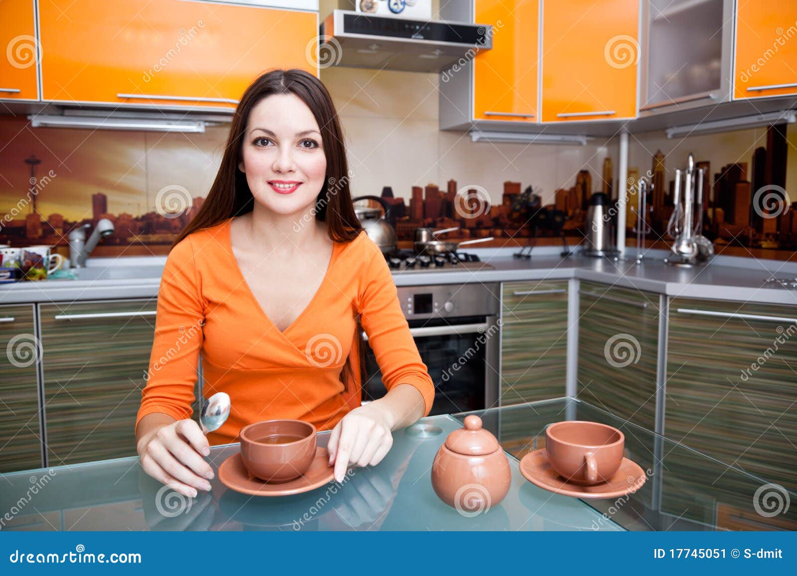 A Beautiful Woman is Drinking in the Kitchen Stock Image - Image of ...