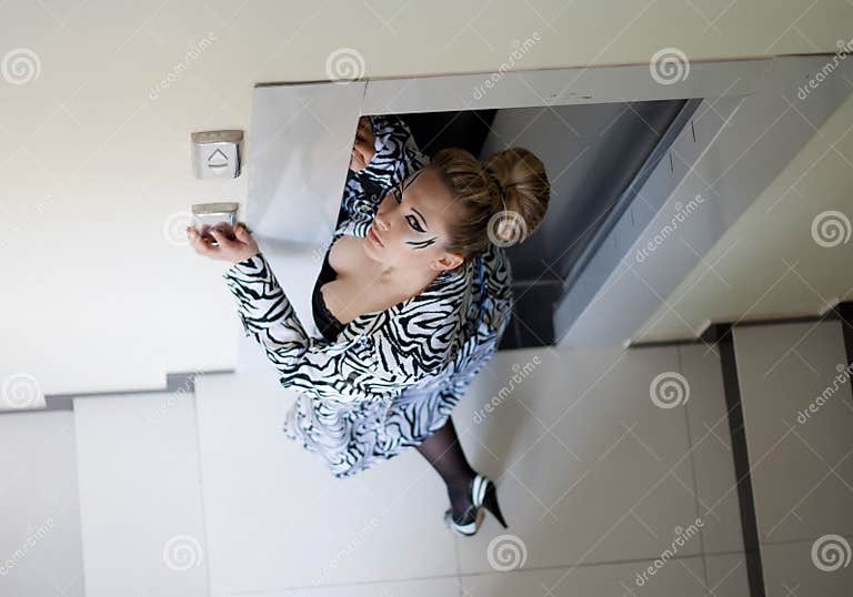 Beautiful Woman in the Elevator Stock Image - Image of outfit, dress ...